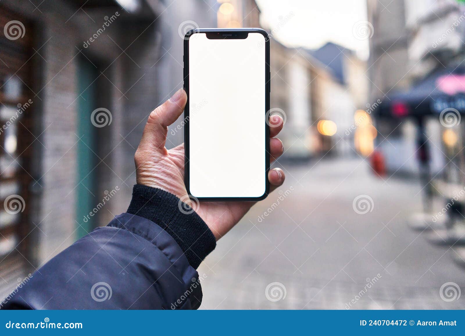 Hand of Man Holding Smartphone at Street Stock Photo - Image of ...