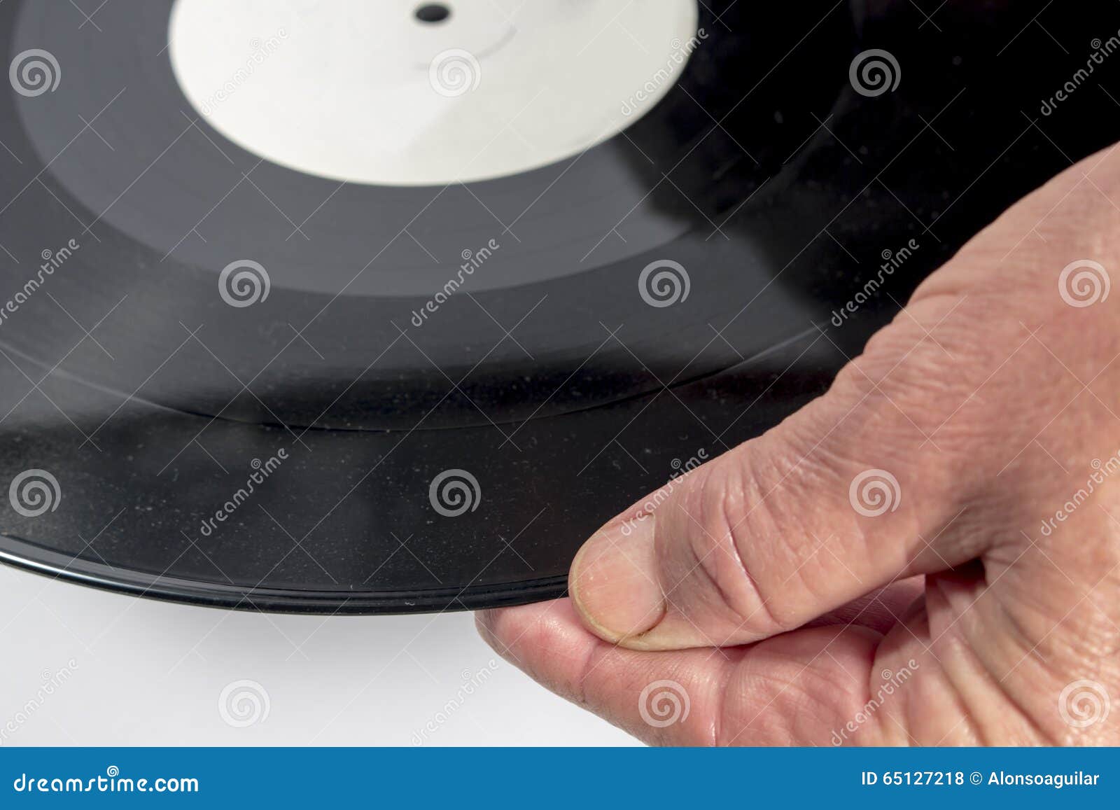 The Hand of a Man Holding a Vinyl Record Stock Photo - Image of ...