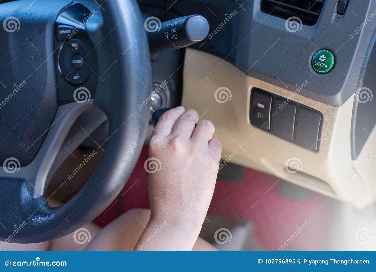 Hand of Man Inserting Key To Start Car System,Button on Dashboard in ...