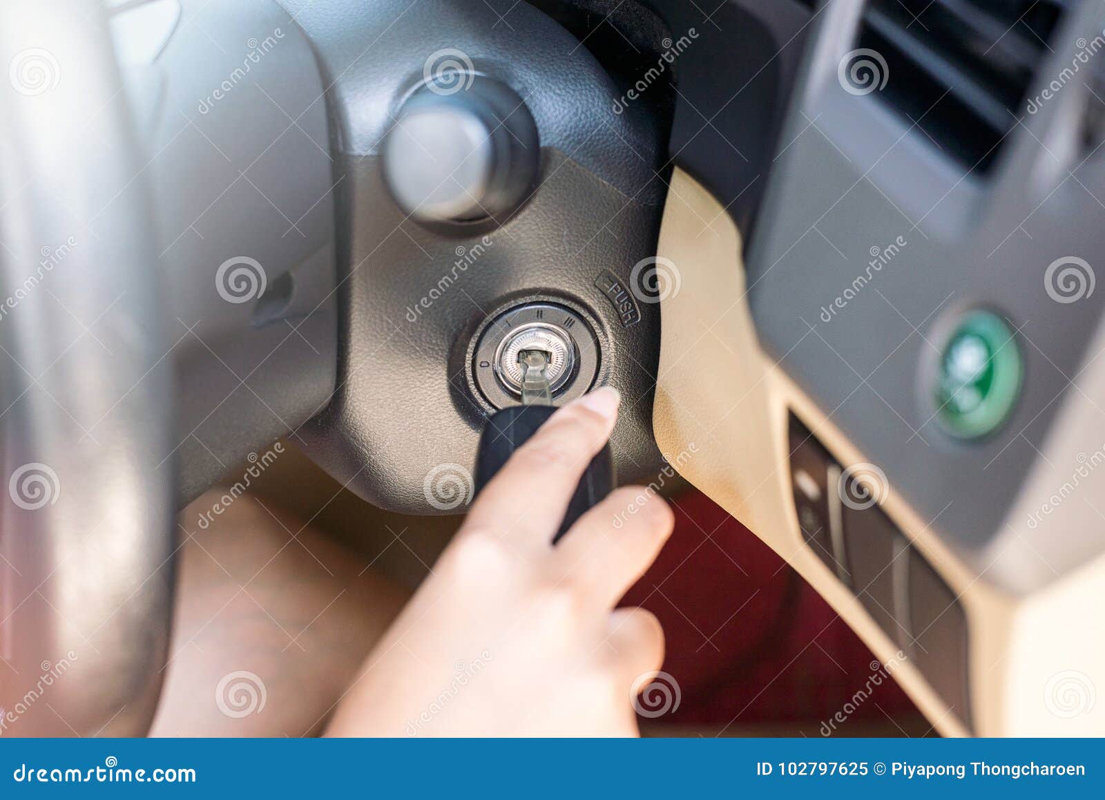 Hand of Man Inserting Key To Start Car System,Button on Dashboard in ...