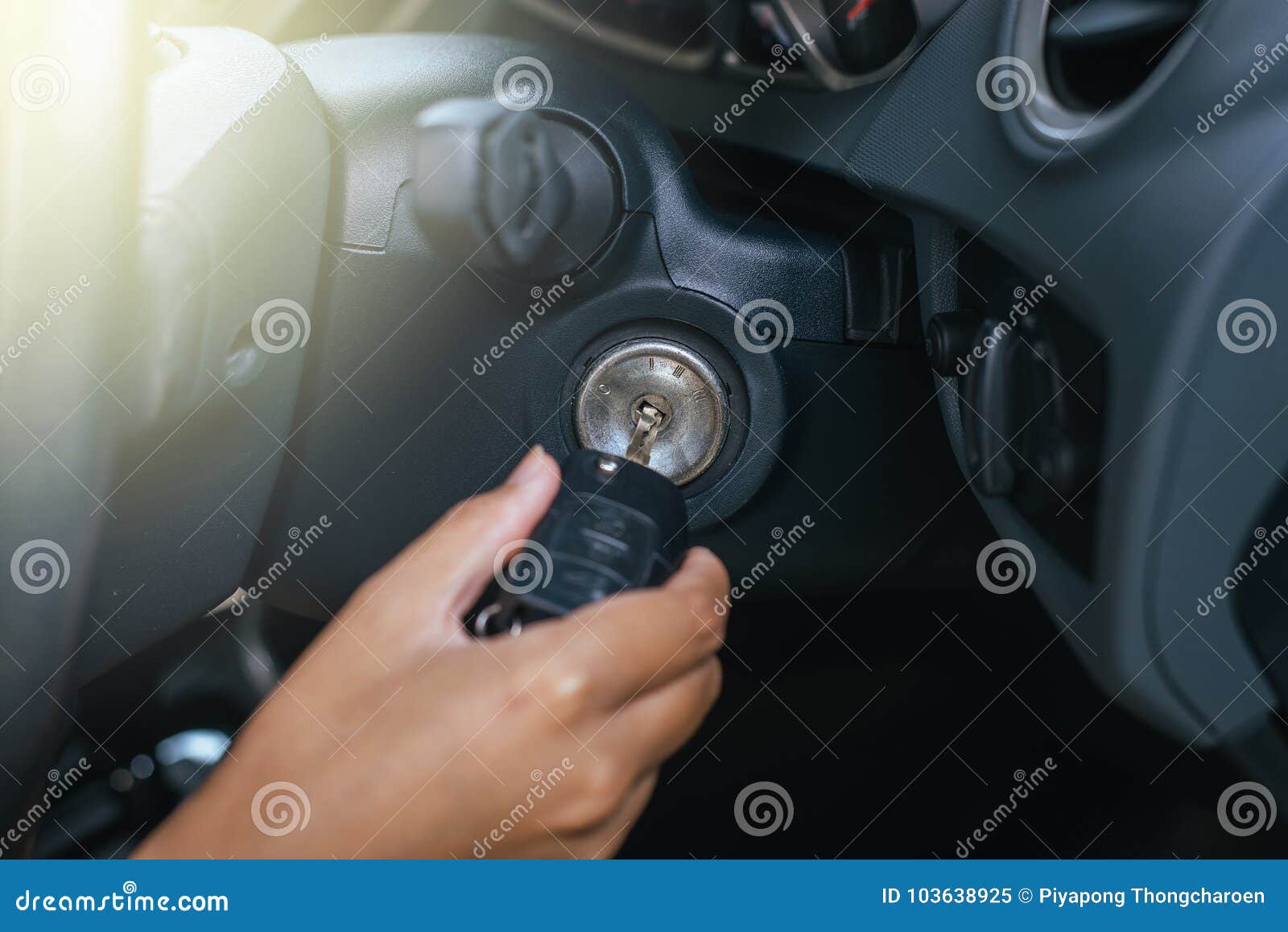 Hand of Man Inserting Key To Start Car System,Button on Dashboard in ...