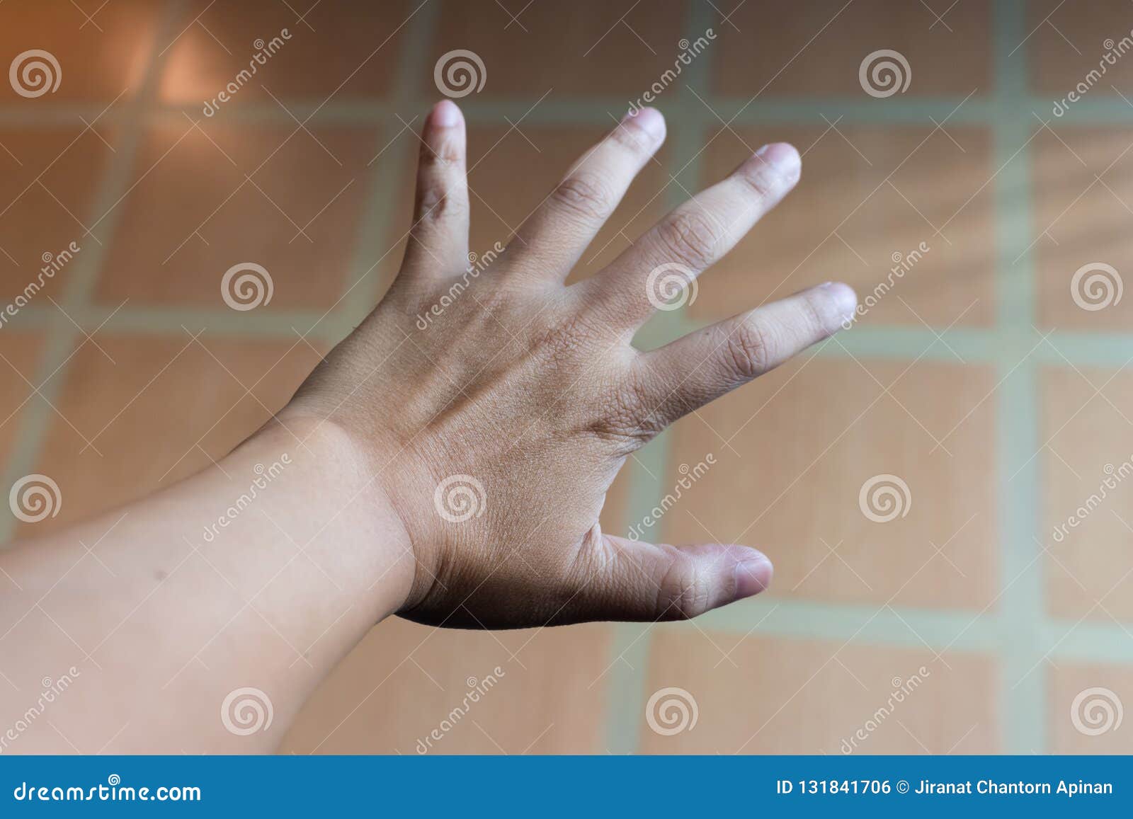 Hand of Man is Over the Grid Pattern of Wood Wall Stock Photo - Image ...