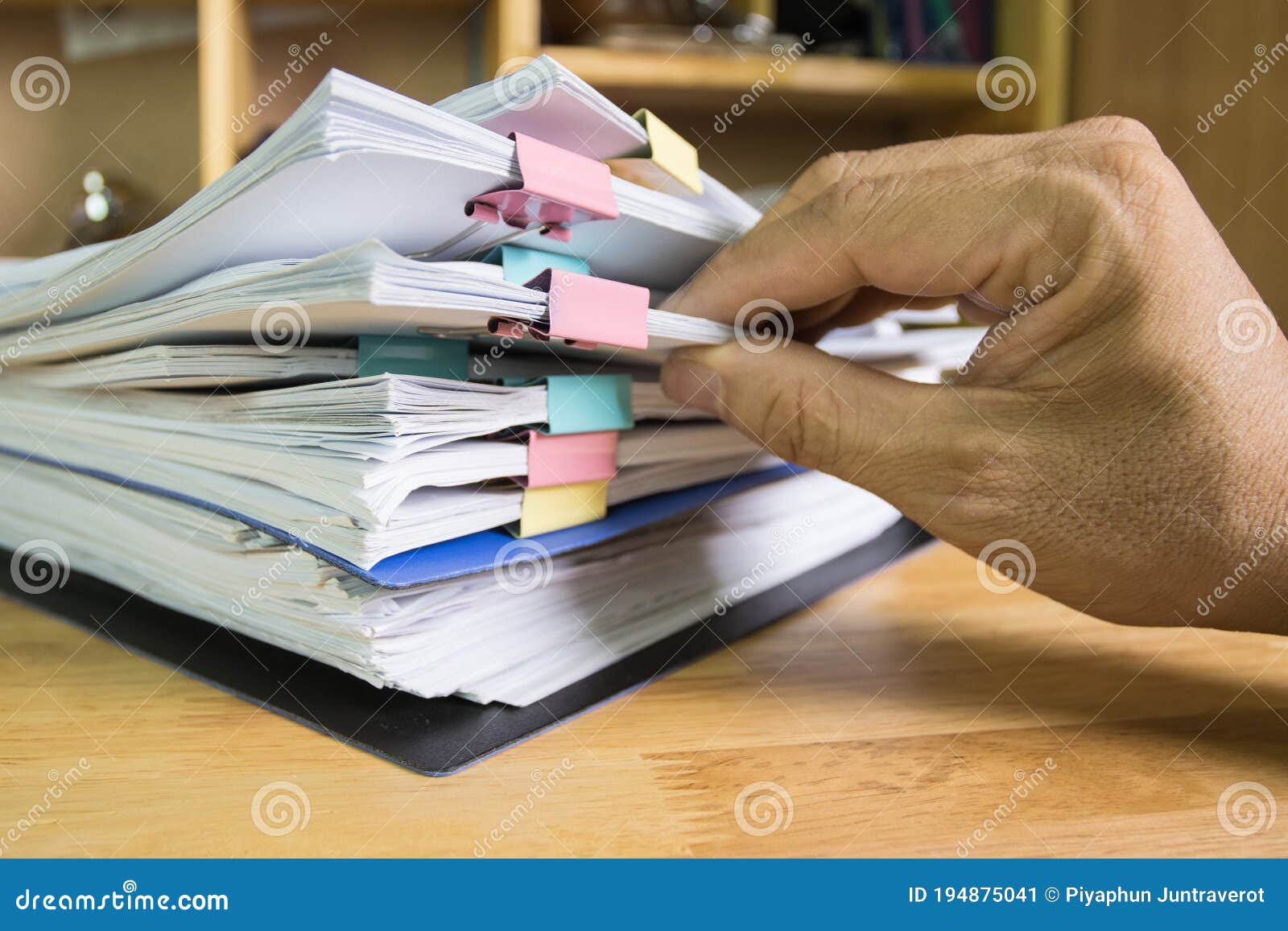 Hand of Man Picked Up the Papers Stock Image - Image of store, picked ...