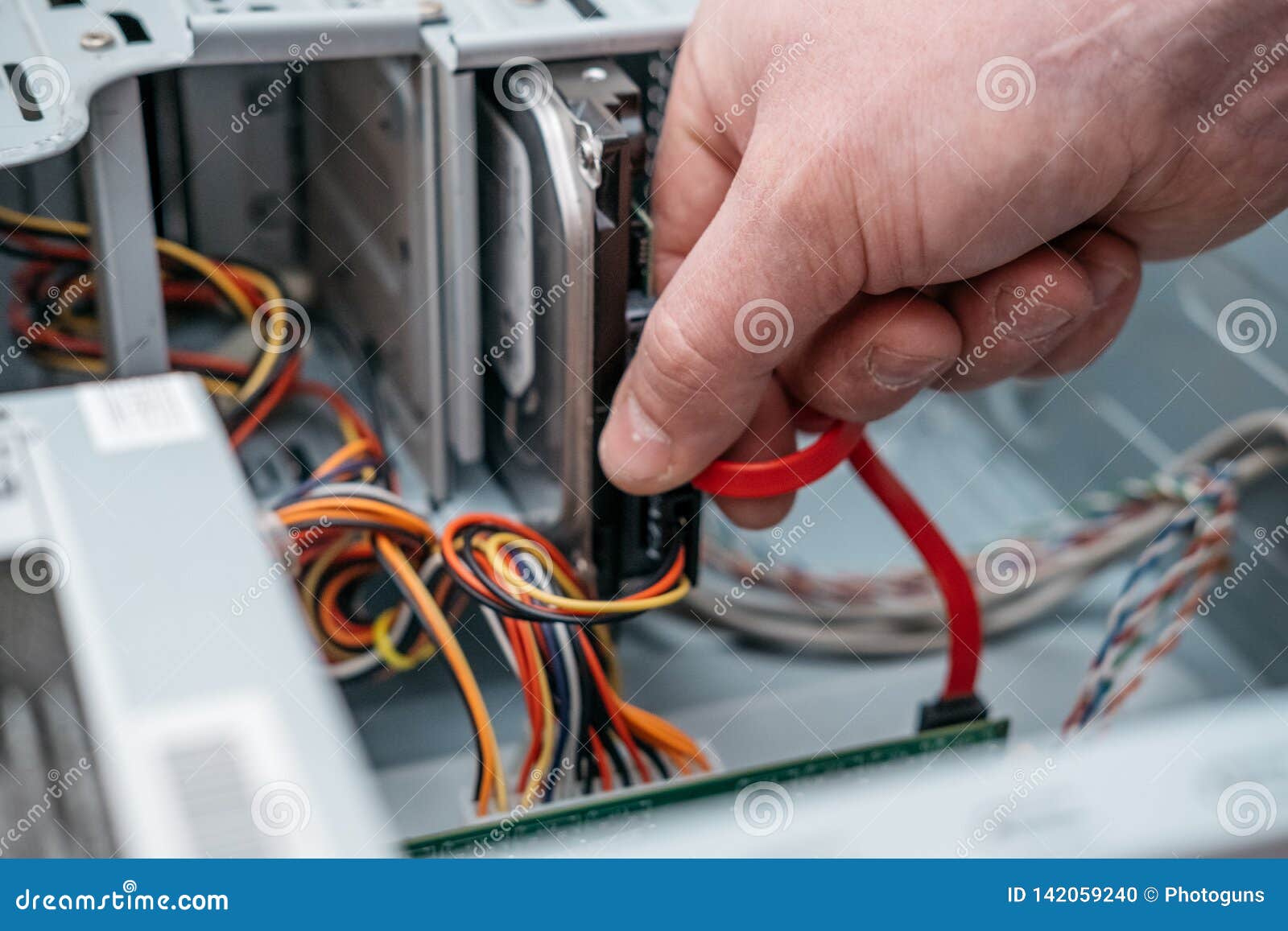 Hand of Man Plugging SATA Serial at Attachment, Serial ATA Data Cable ...