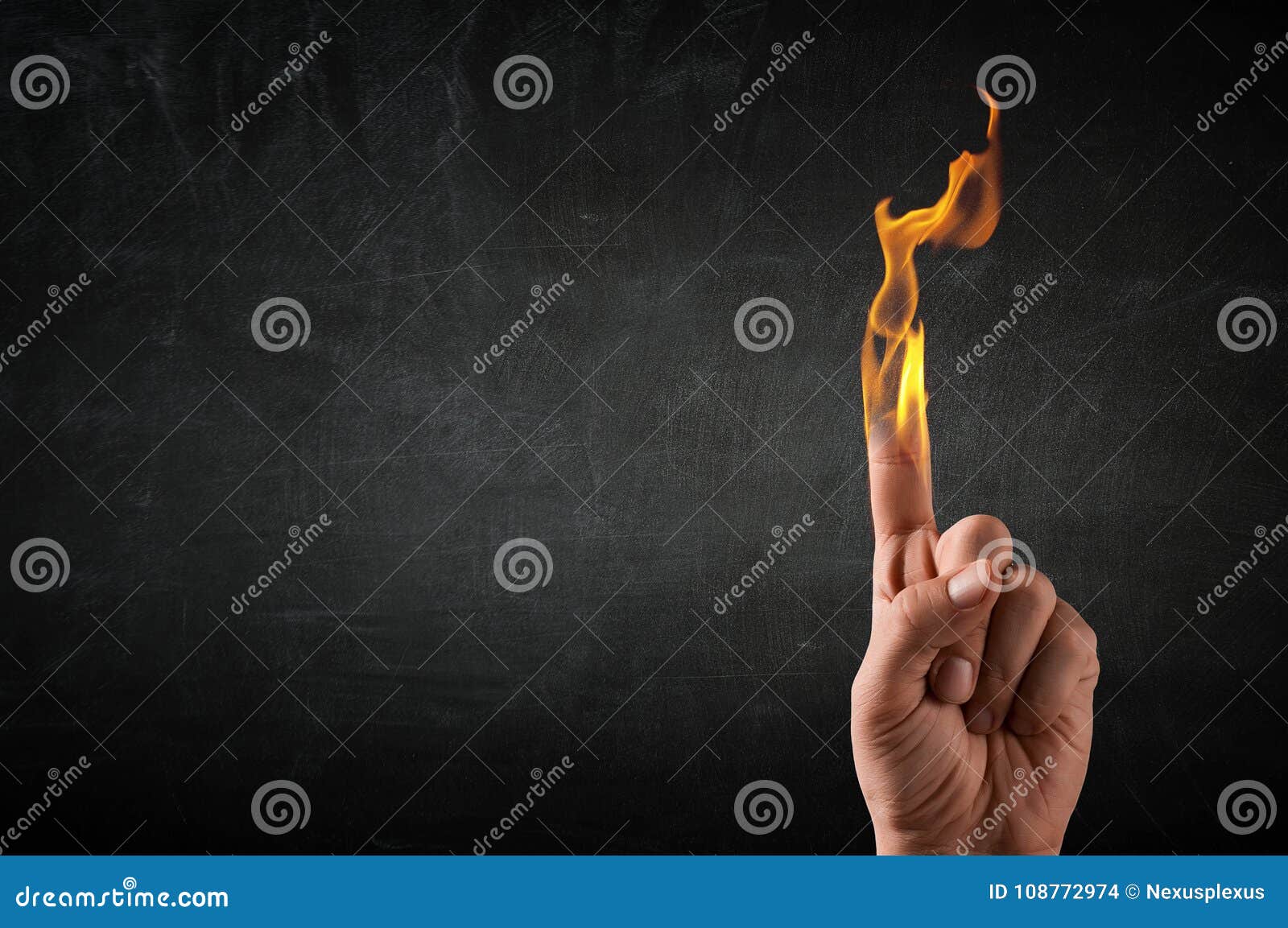 Fire burning in his hands stock photo. Image of burning - 108772974