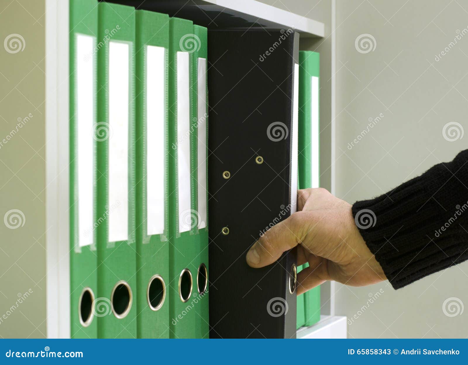 Hand Man Pulls Out a Folder from a Shelf Stock Image - Image of ...