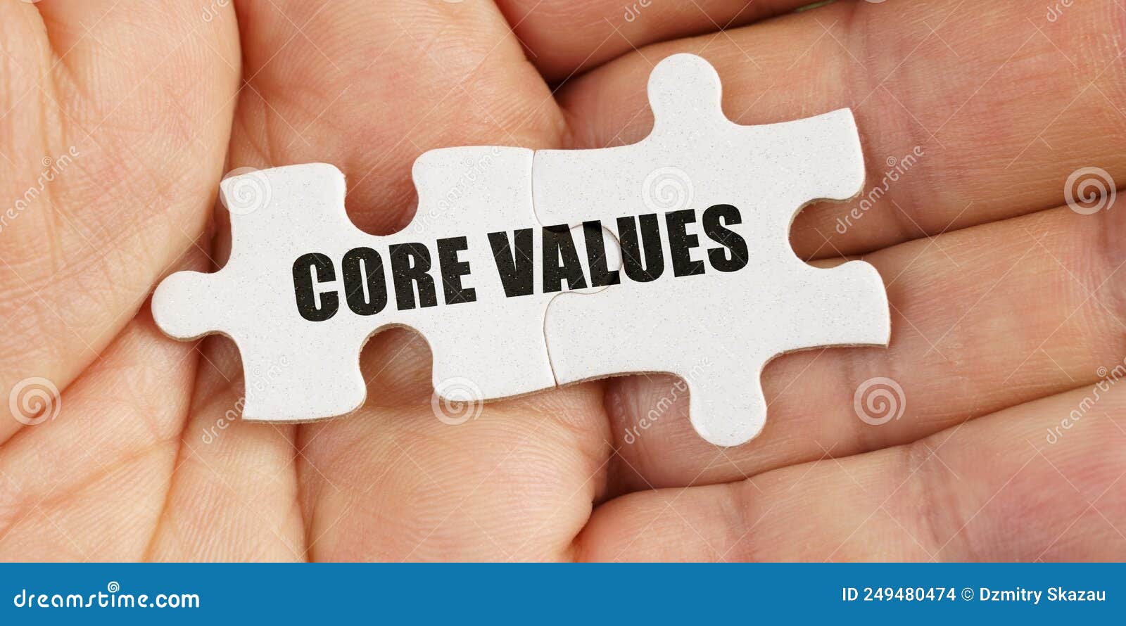 In the Hand of a Man are Puzzles with the Inscription - CORE VALUES ...