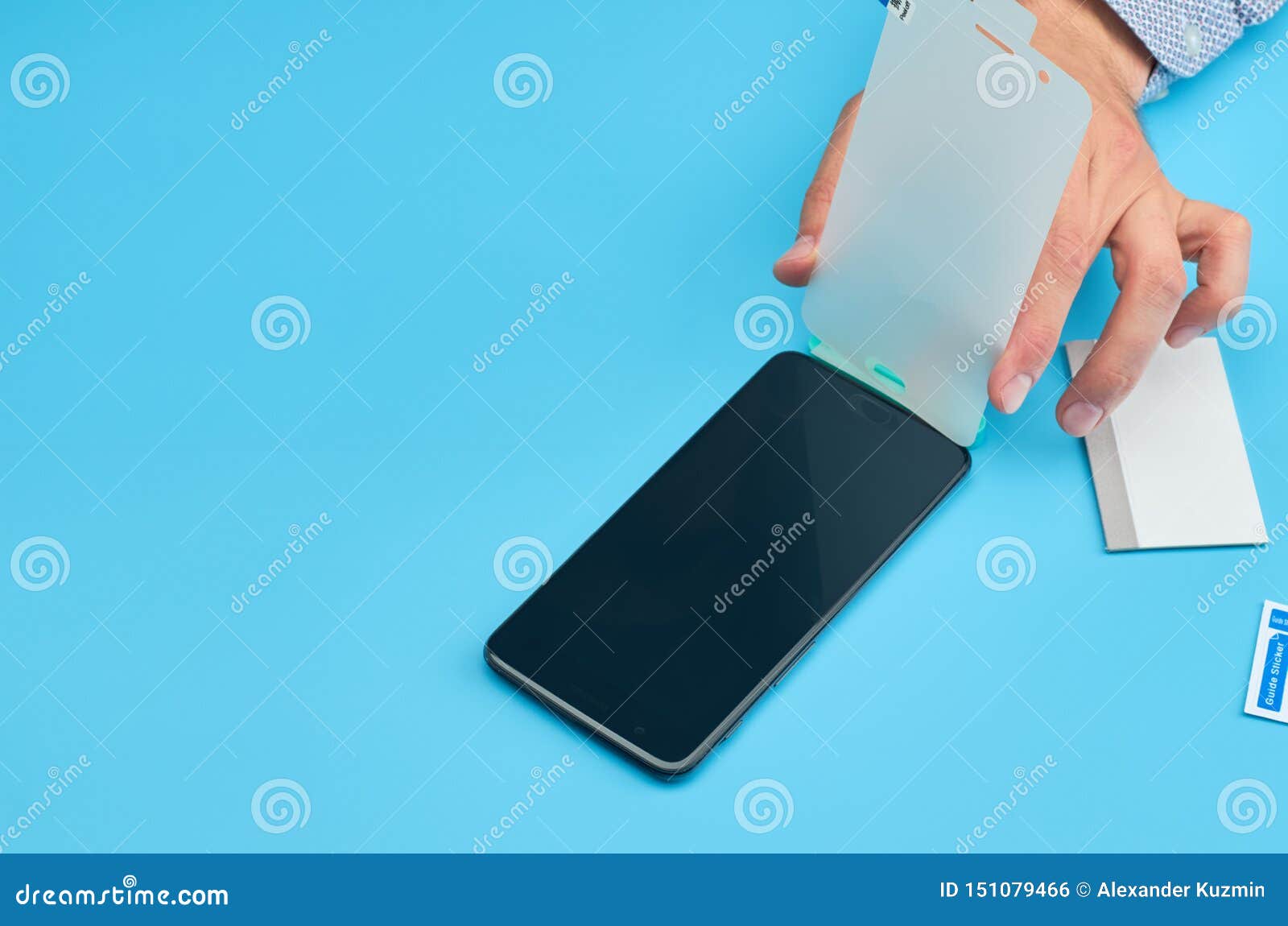 The Man Replacing the Broken Tempered Glass Screen Protector for ...