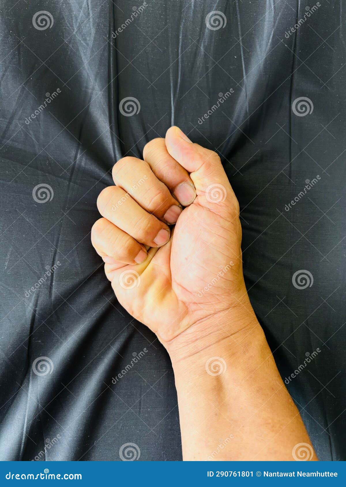 Hand stock image. Image of fabric, black, hand, clenched - 290761801