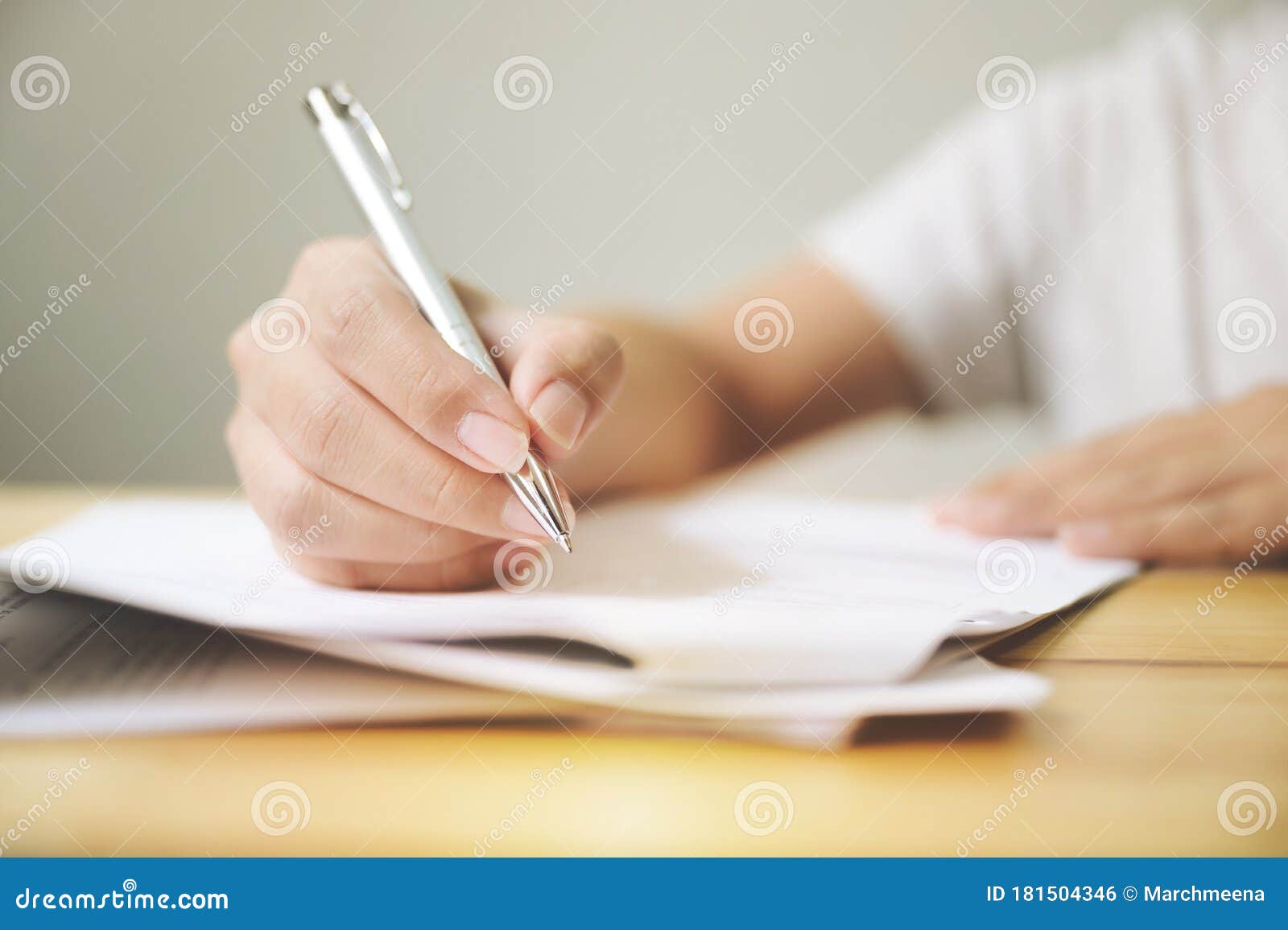 Hand of Man Signing Signature Filling in Paperwork Stock Photo - Image ...