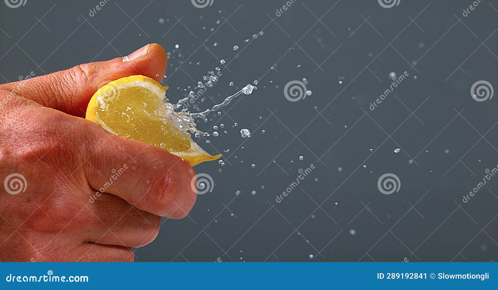 Hand of Man Squeezing Lemon, Citrus Limonum Against Black Background ...