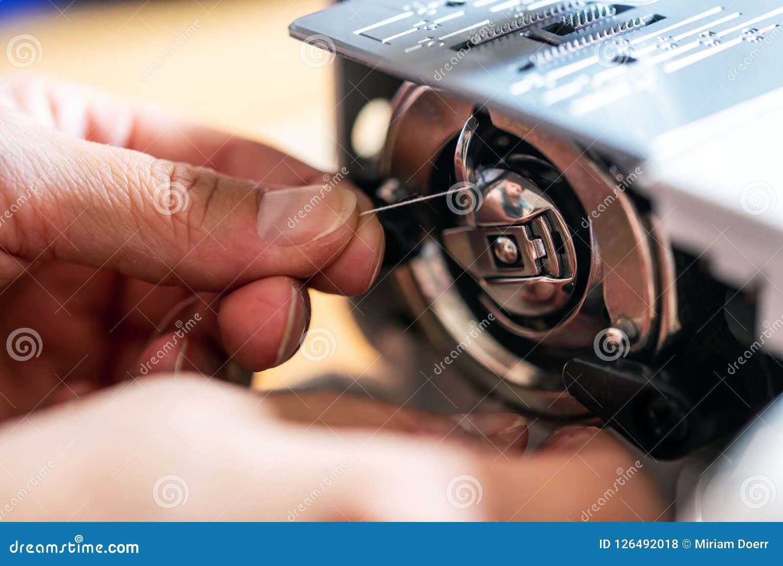 Hand of a Man is Threading a Thread at the Presser Foot Stock Photo ...
