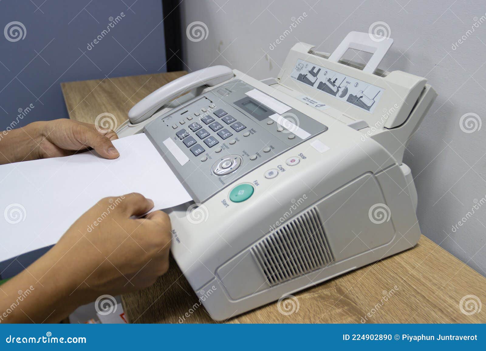 Hand Man are Using a Fax Machine in the Office, Equipment for Data ...