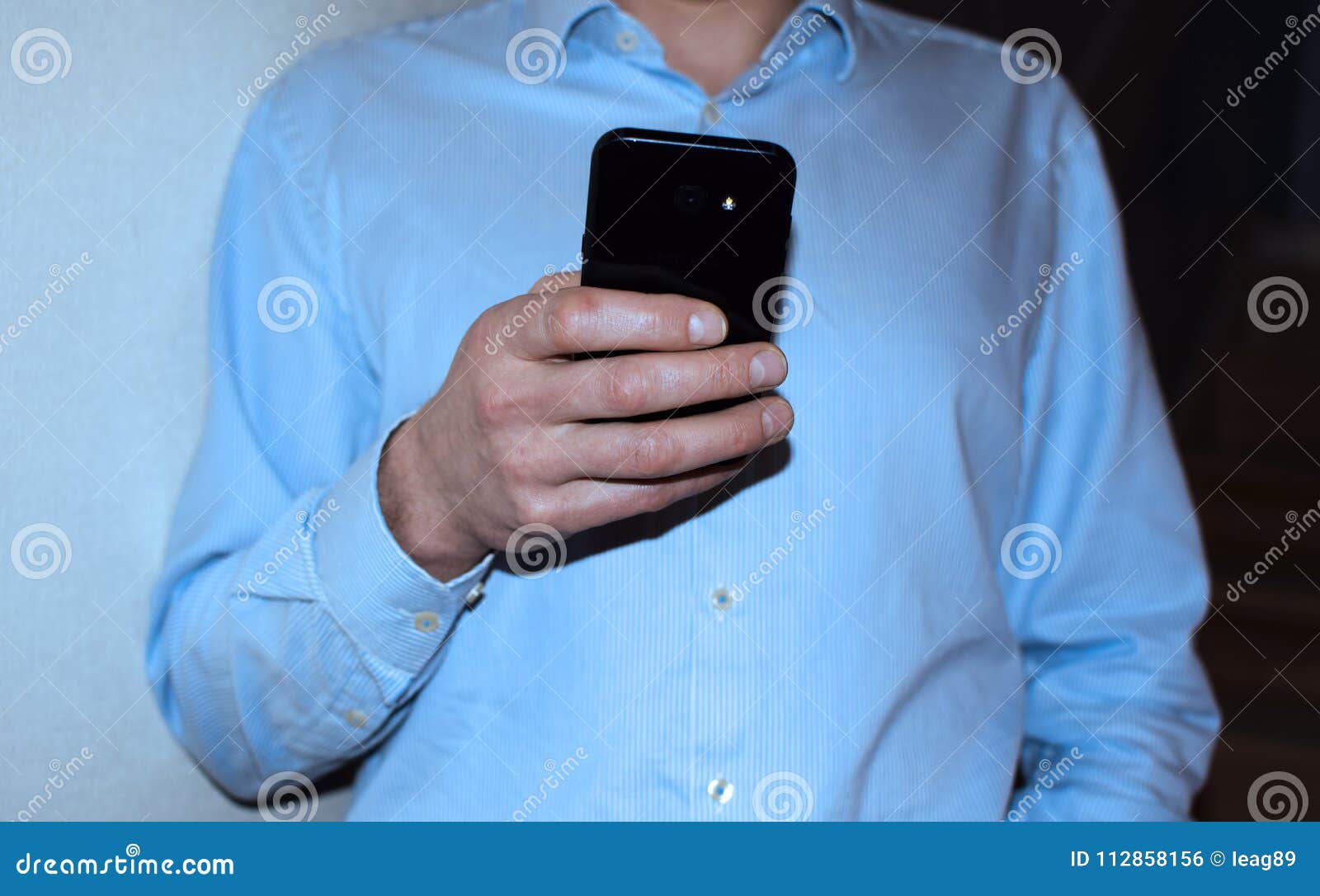 Hand of Man Using Smartphone Stock Photo - Image of game, formal: 112858156