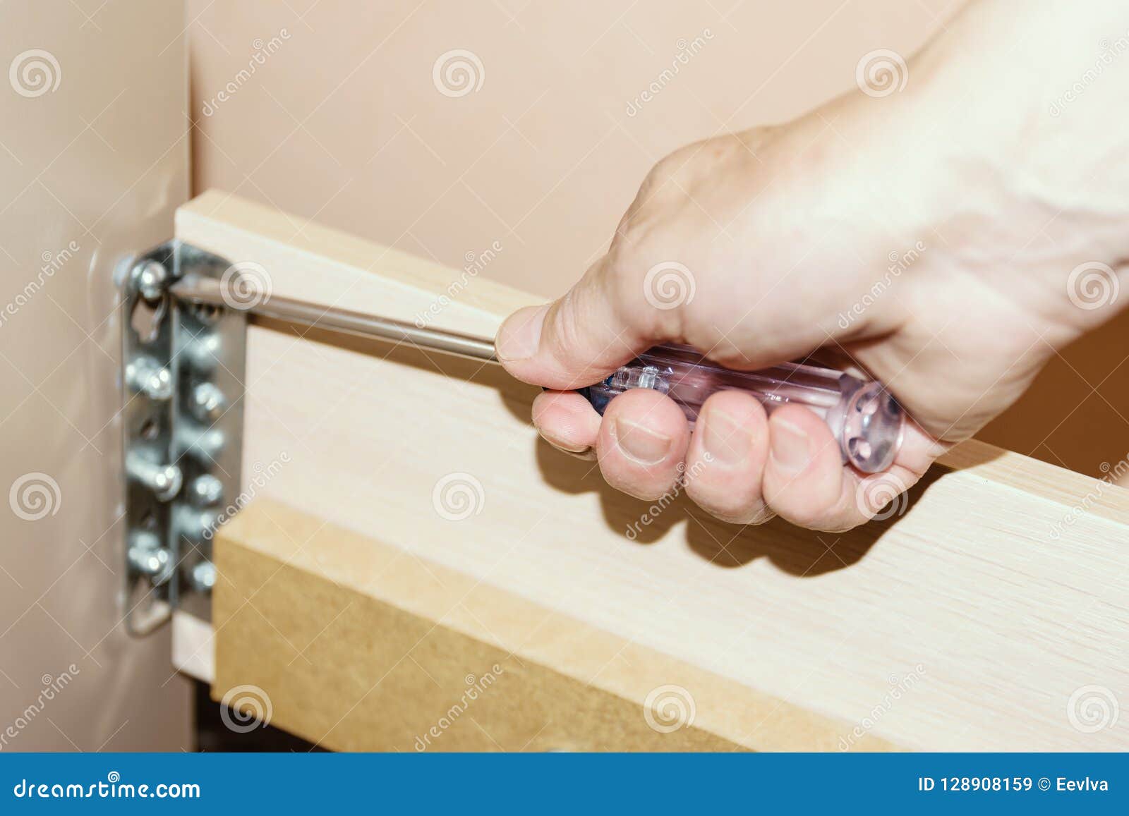 Man using screwdriver. stock image. Image of hand, close - 128908159