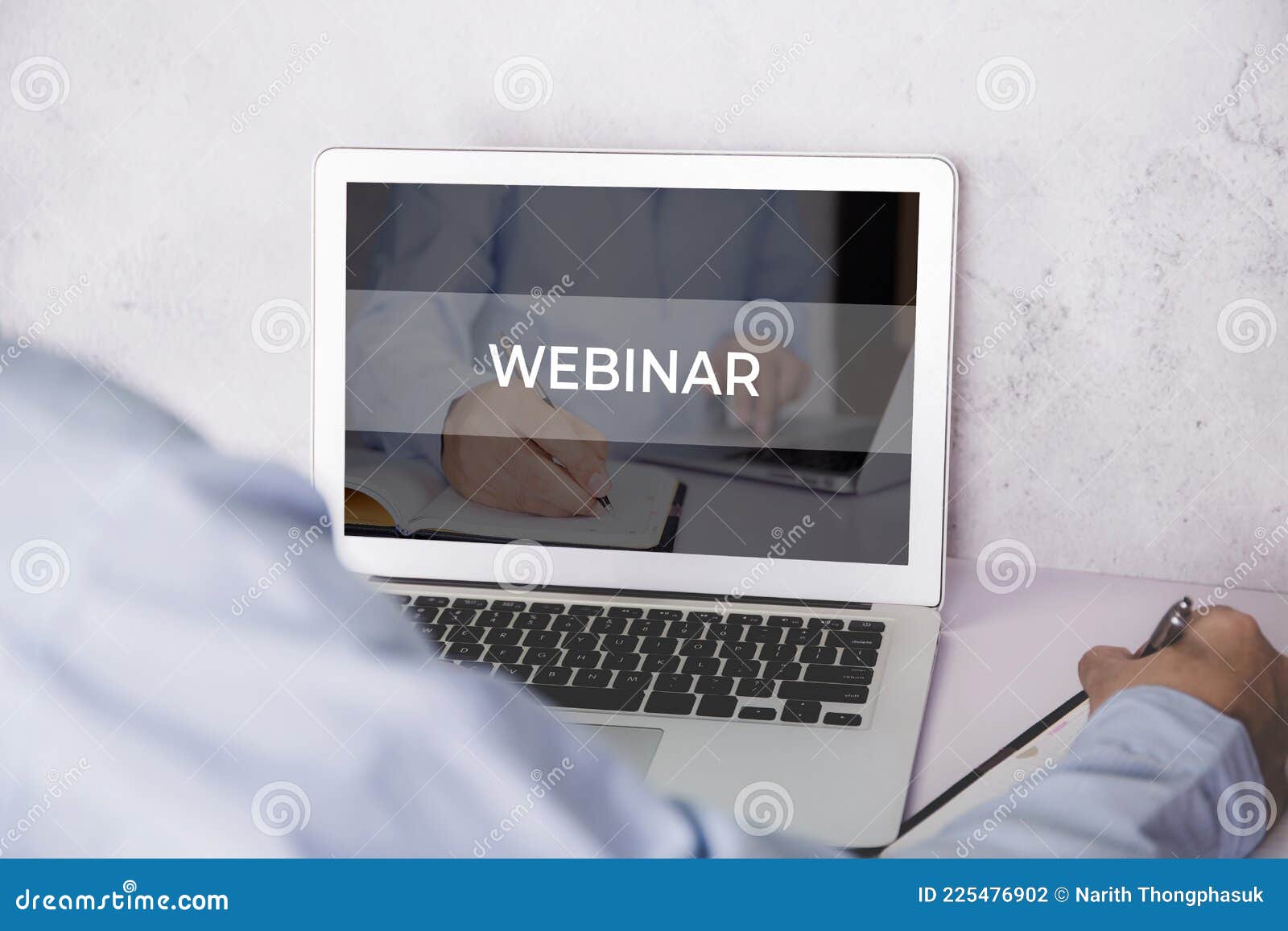 Hand of Man Watching Webinar on Laptop Computer and Writing on Notebook ...