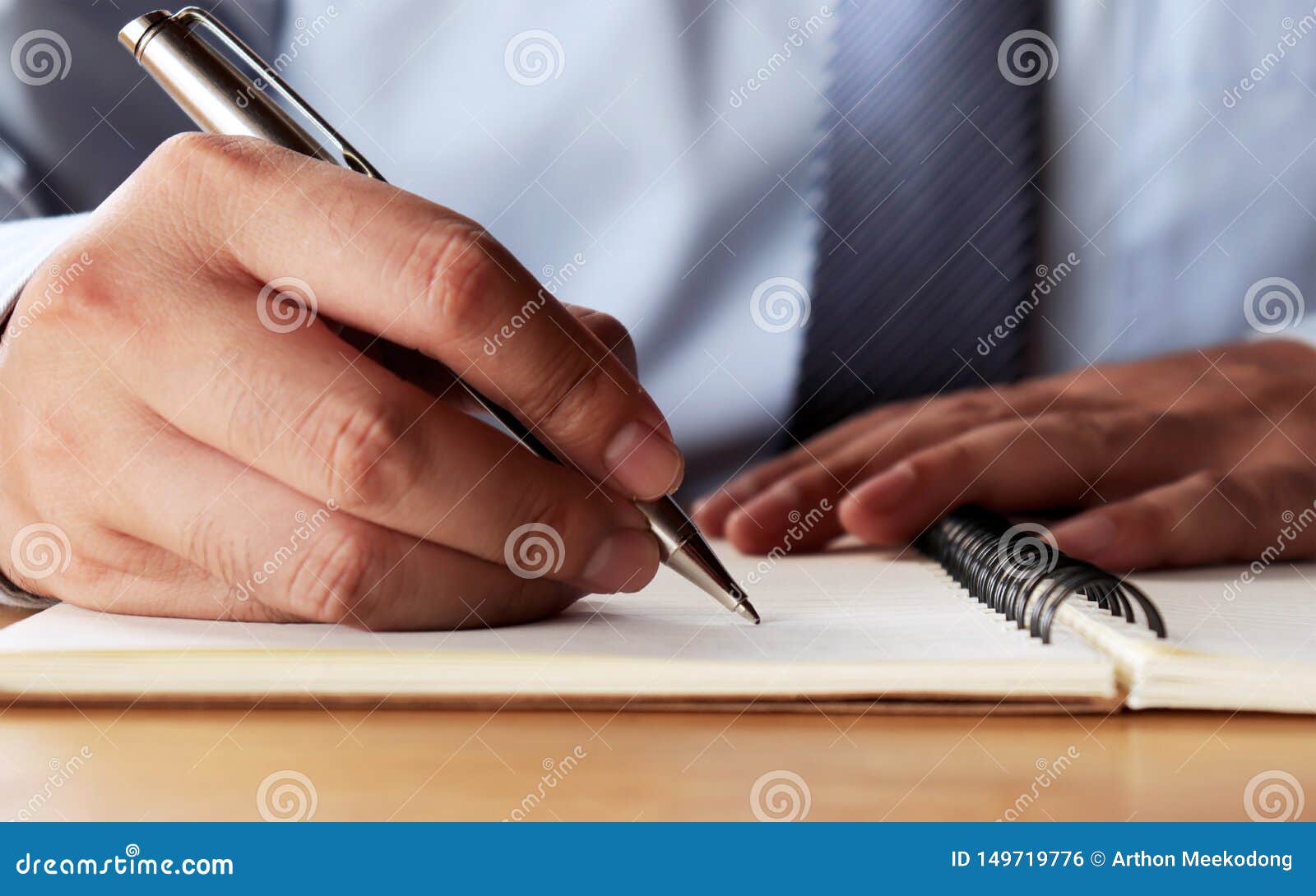 The Hand of the Man Who Wrote the Book Stock Photo - Image of contract ...