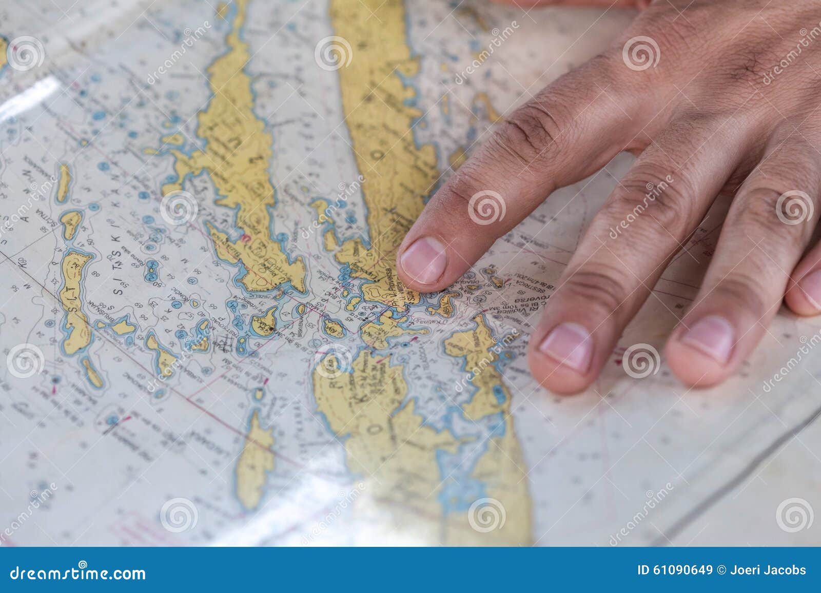 Hand on a map stock image. Image of destination, holding - 61090649