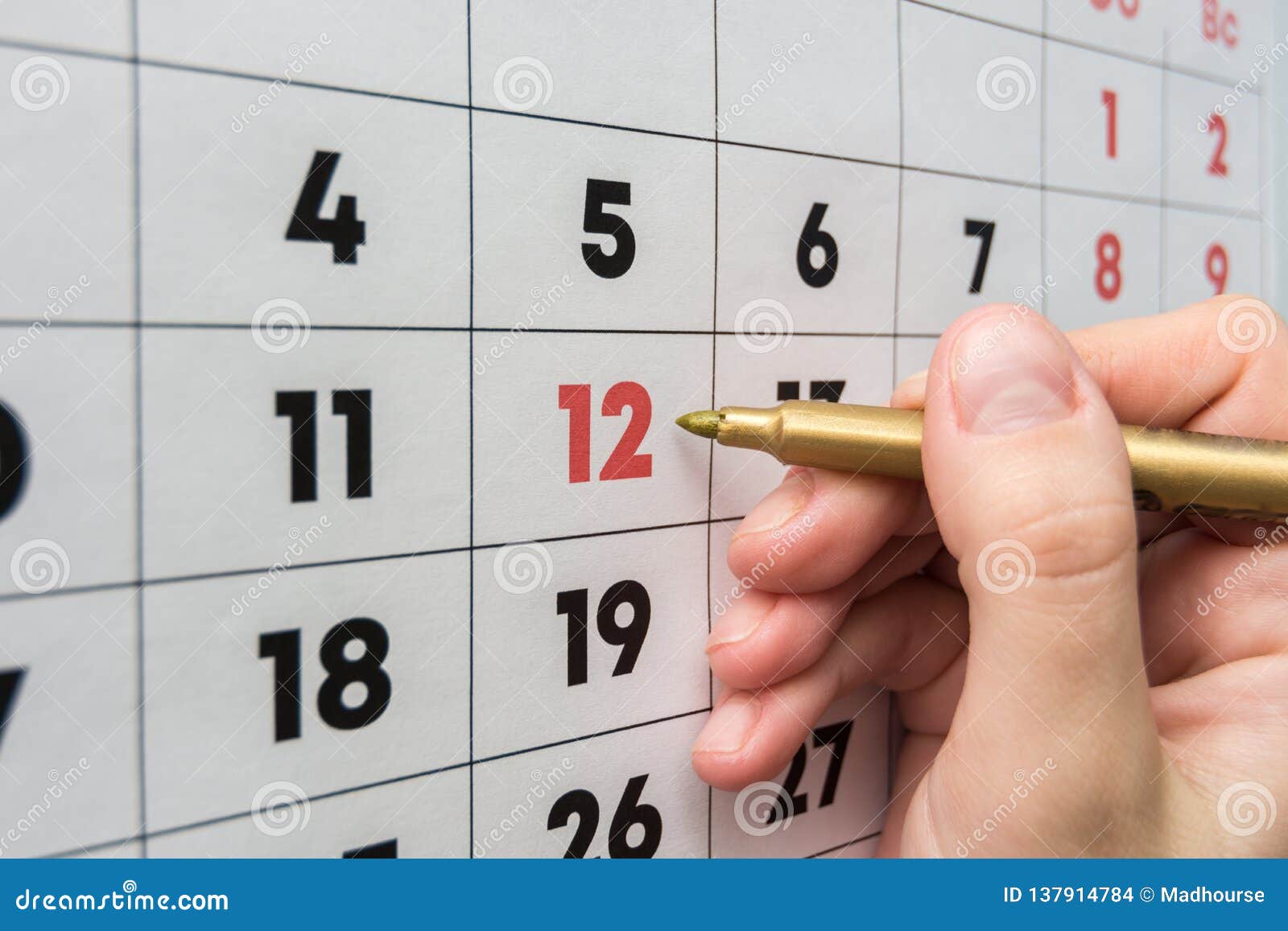 Hand Marker On The Wall Calendar Marks The Date Of The Holiday Royalty ...