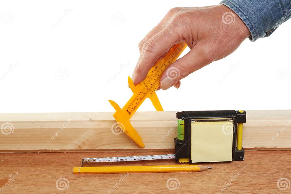 Hand measuring stock photo. Image of lumber, square, tool - 25595416
