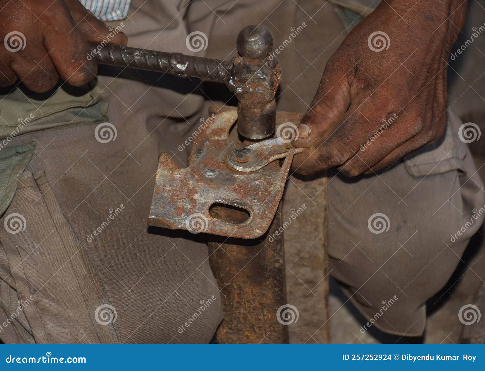 Hand of a Mechanic Beating a Meta Stock Photo - Image of metal, wheel ...