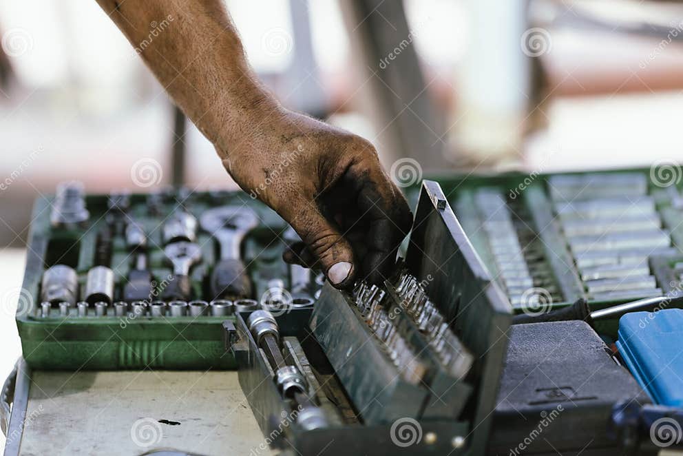 Hand of a Mechanic Choosing the Tool he Needs Stock Image - Image of ...
