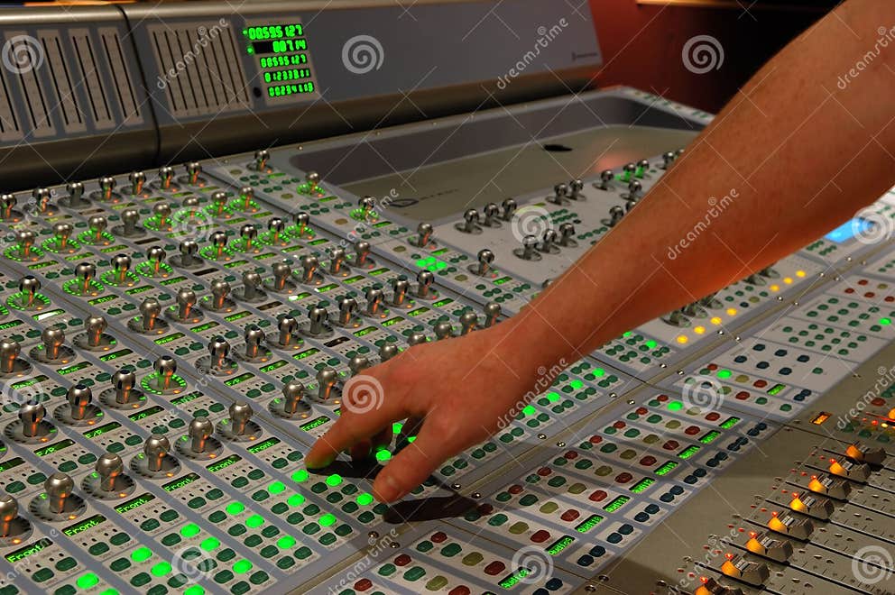 Hand on mixing console stock photo. Image of track, electronic - 2442720