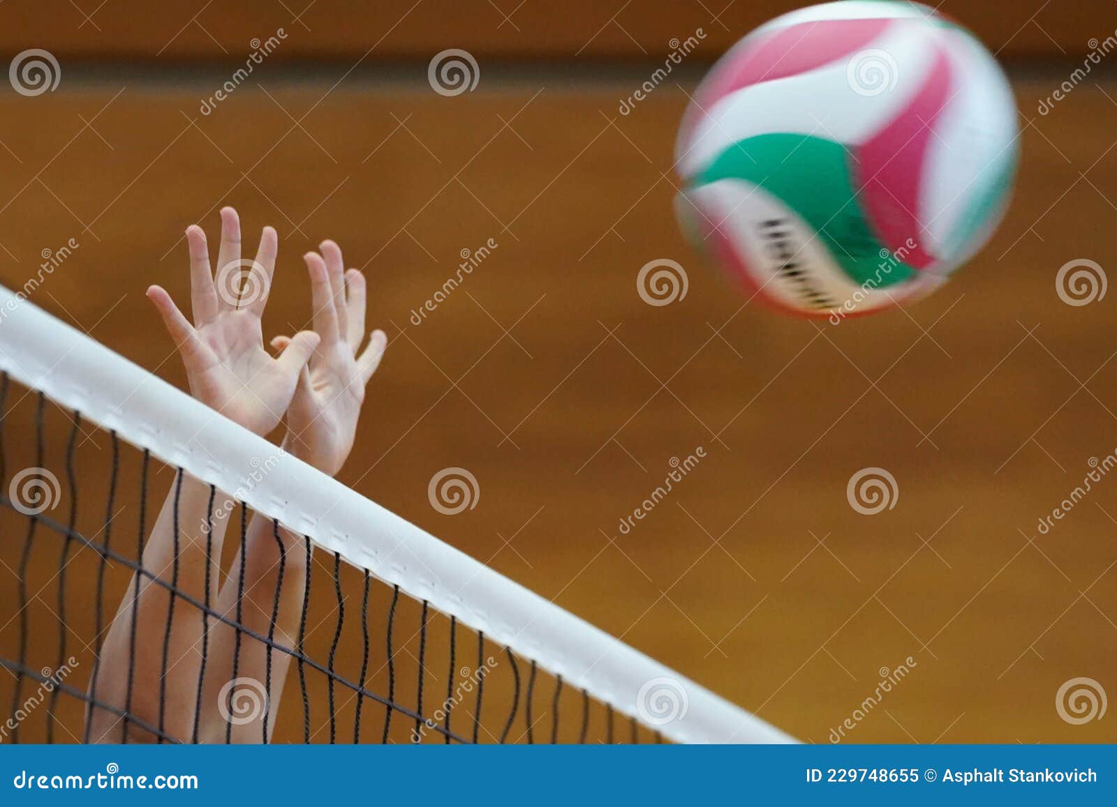 The Hand at the Moment of Blocking a Volleyball at the Net. Stock Image ...