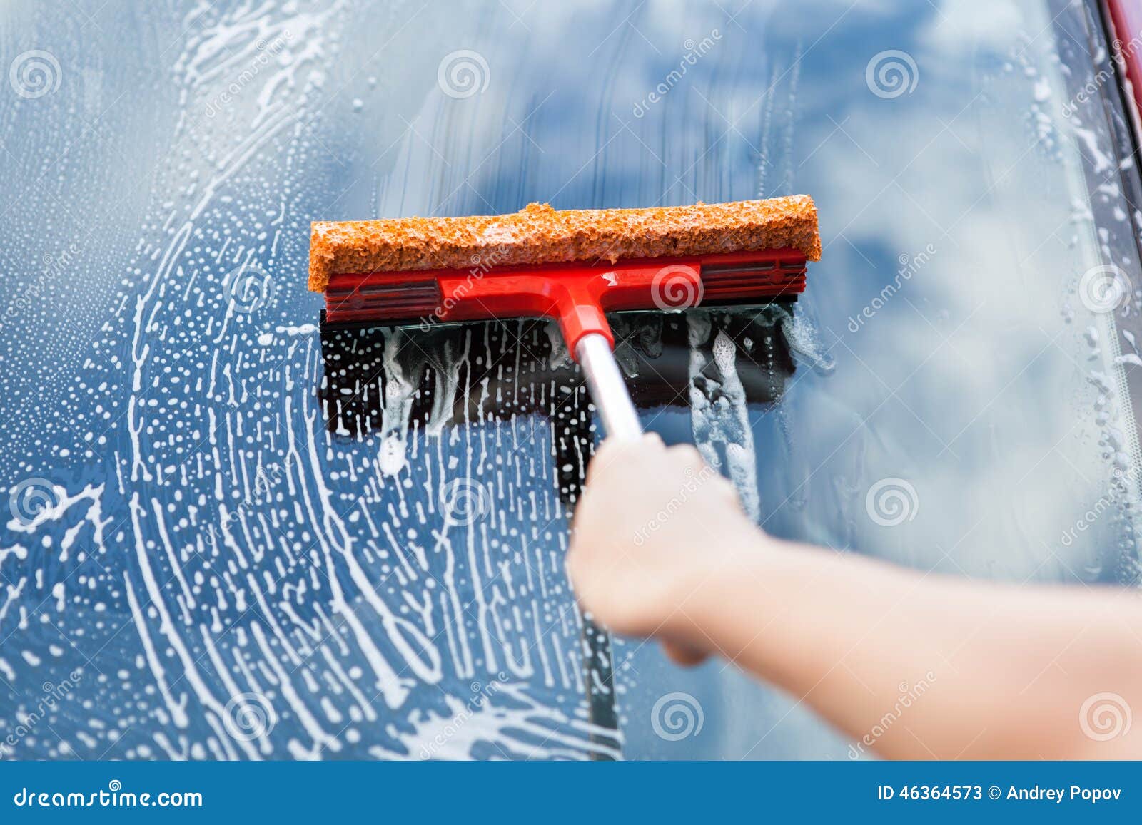 Hand with mop on car stock image. Image of close, glass - 46364573
