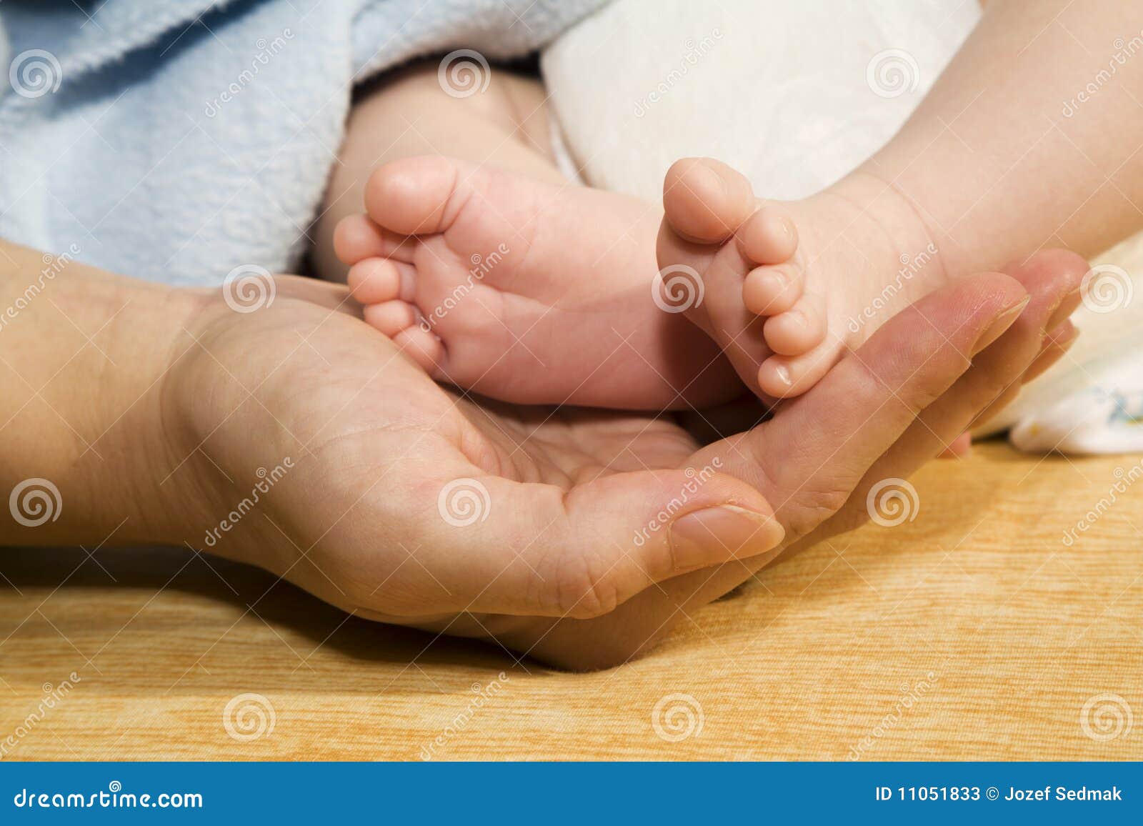 Hand of Mother and Feet of Baby Stock Image - Image of family, parent ...