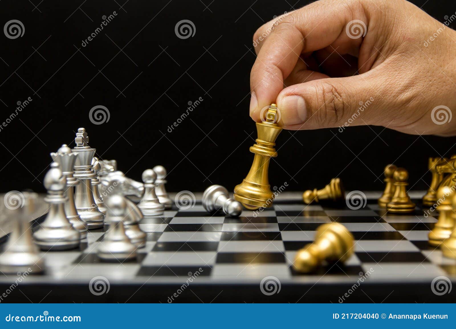 Hand move chess board game stock photo. Image of action - 217204040