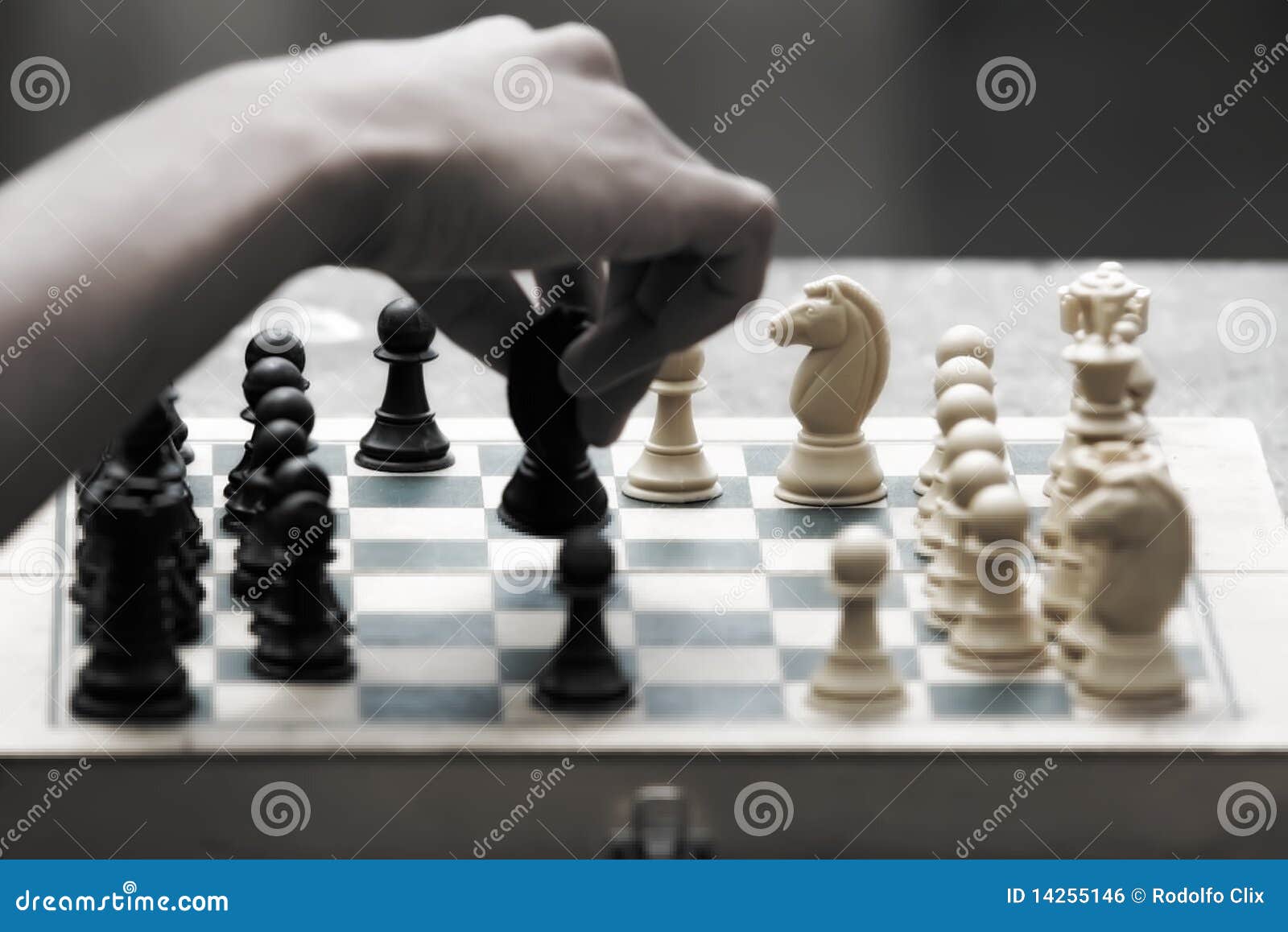 Hand moving chess piece stock photo. Image of checkered - 14255146