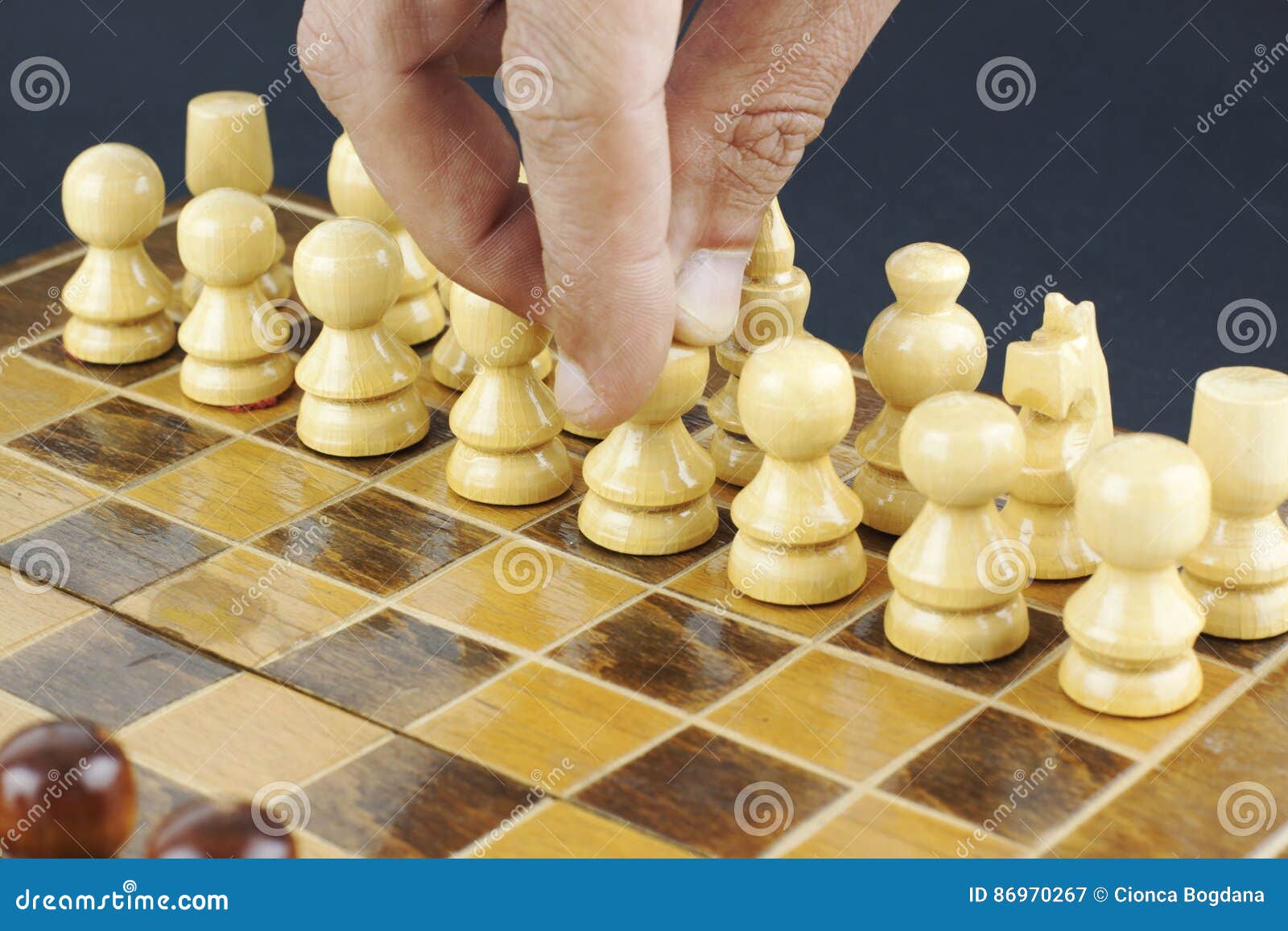 Hand moving a pawn stock image. Image of knight, board - 86970267