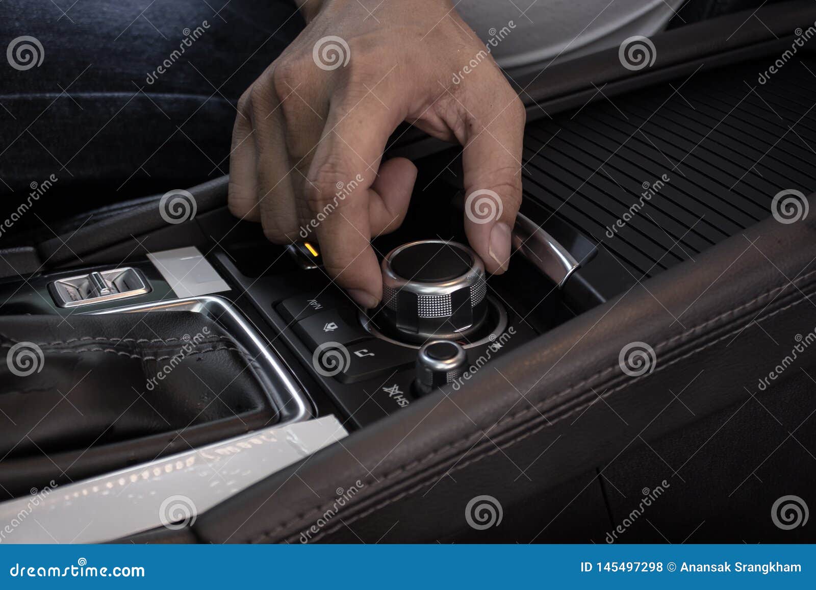Hand on Multimedia Control Buttons of a Modern Car Stock Photo - Image ...