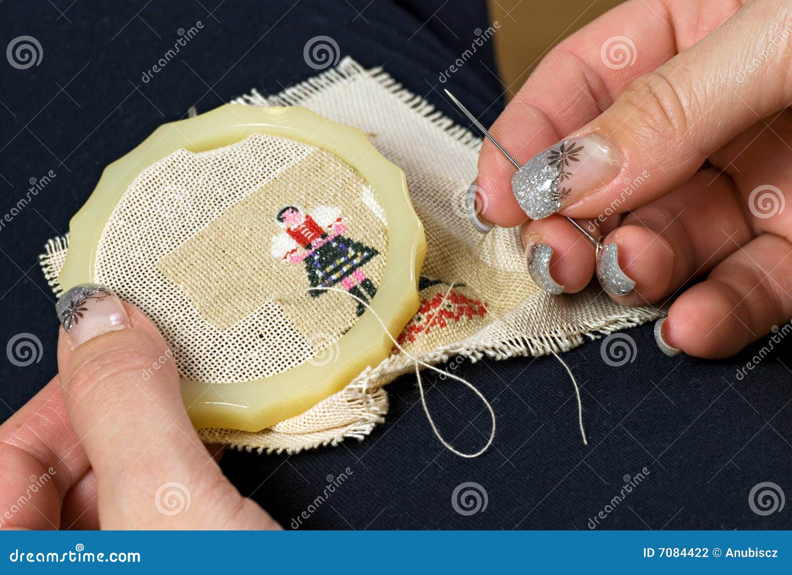 Hand needlework stock photo. Image of embroidery, dress - 7084422