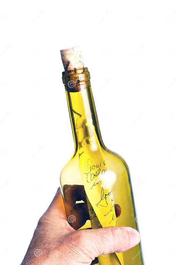 Hand with a Note in a Bottle Stock Image - Image of stranded, message ...