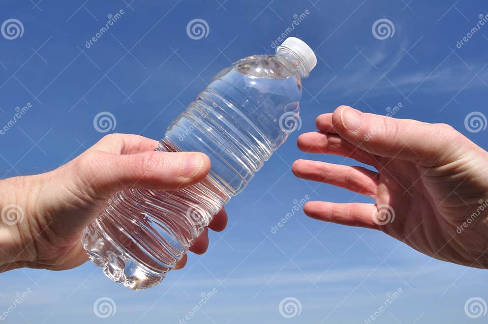 Hand Offering a Bottle of Water Stock Photo - Image of offering, blue ...