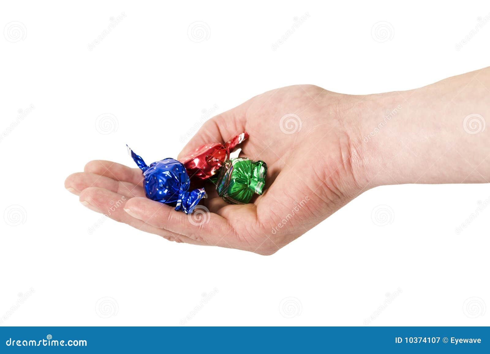 Hand offering candies stock image. Image of body, hand - 10374107