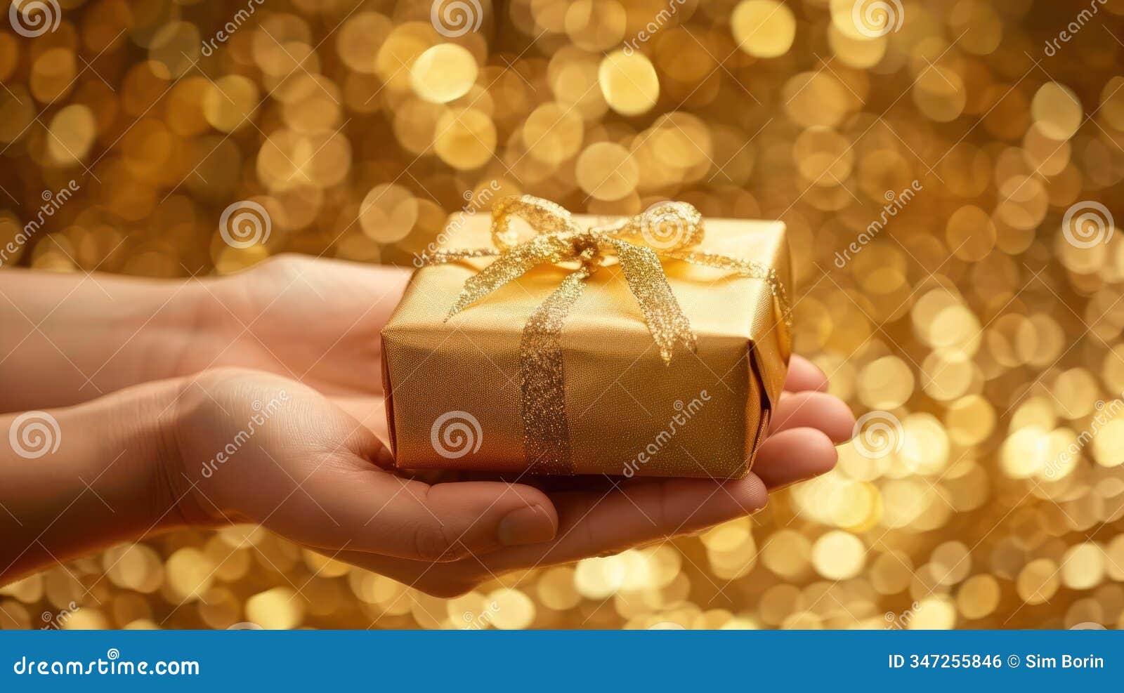 Hand Offering a Elegantly Wrapped Present on a Solid Gold Background ...