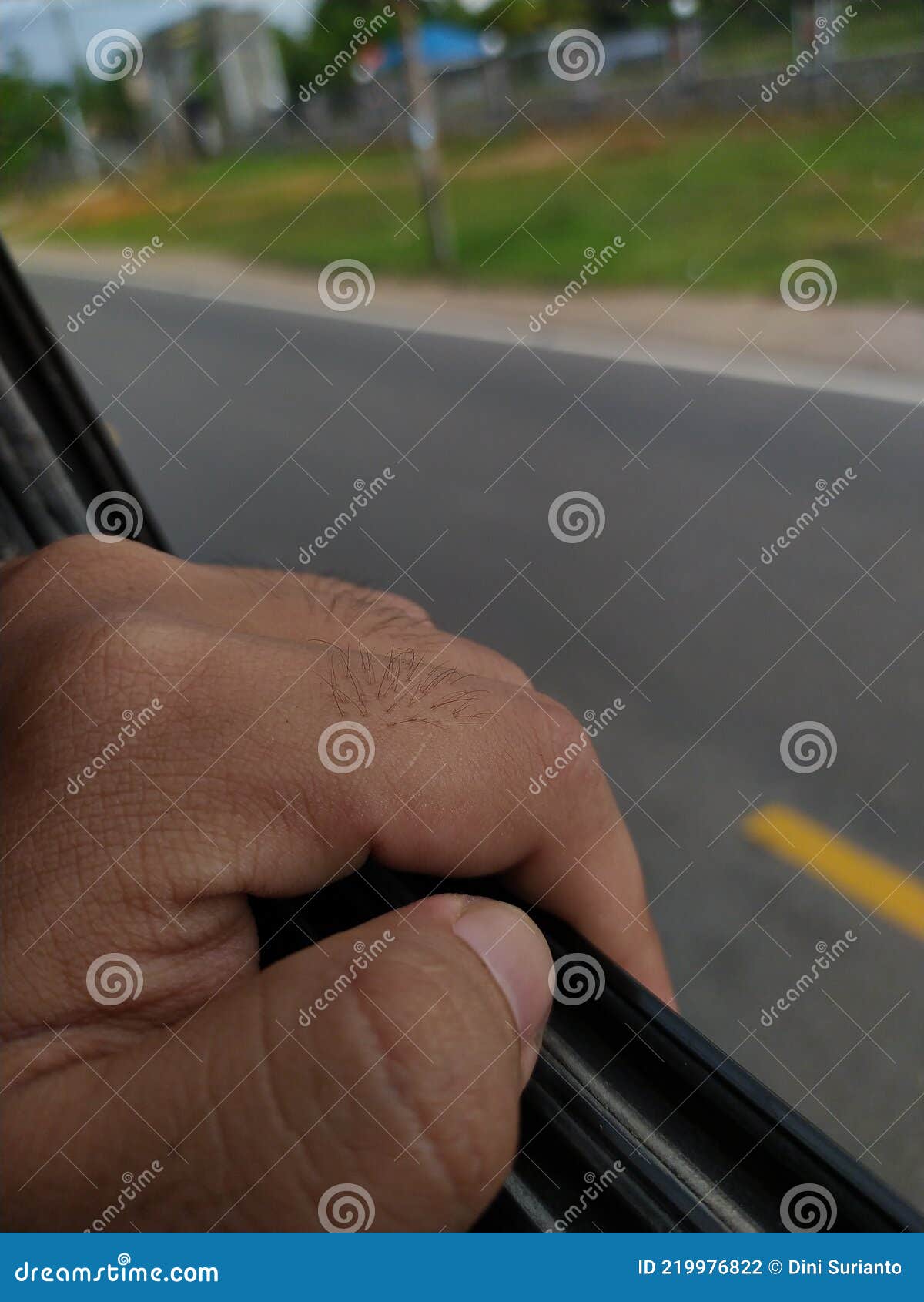 Hand ond bus window stock photo. Image of yellow, interaction - 219976822