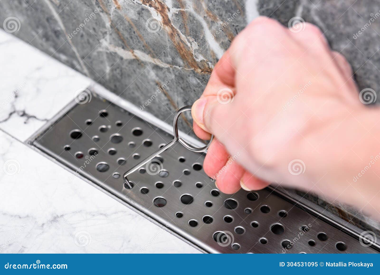 Hand Open Linear Shower Drain System Using Hook. Stock Image - Image of ...