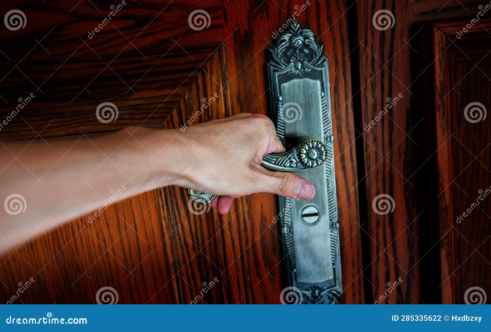 Hand opening door handle stock photo. Image of knob - 285335622