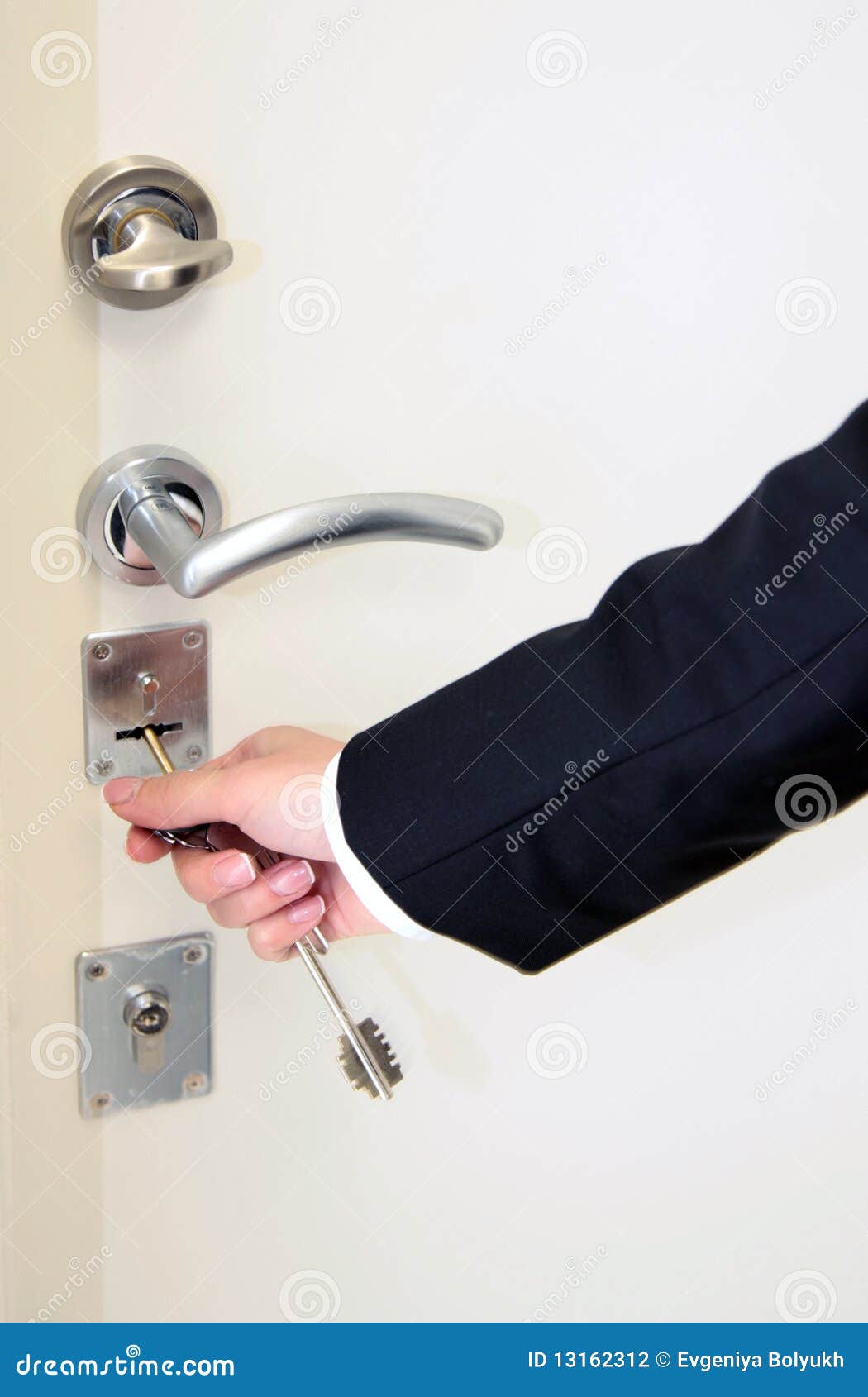 Hand opening door with key stock photo. Image of depart - 13162312