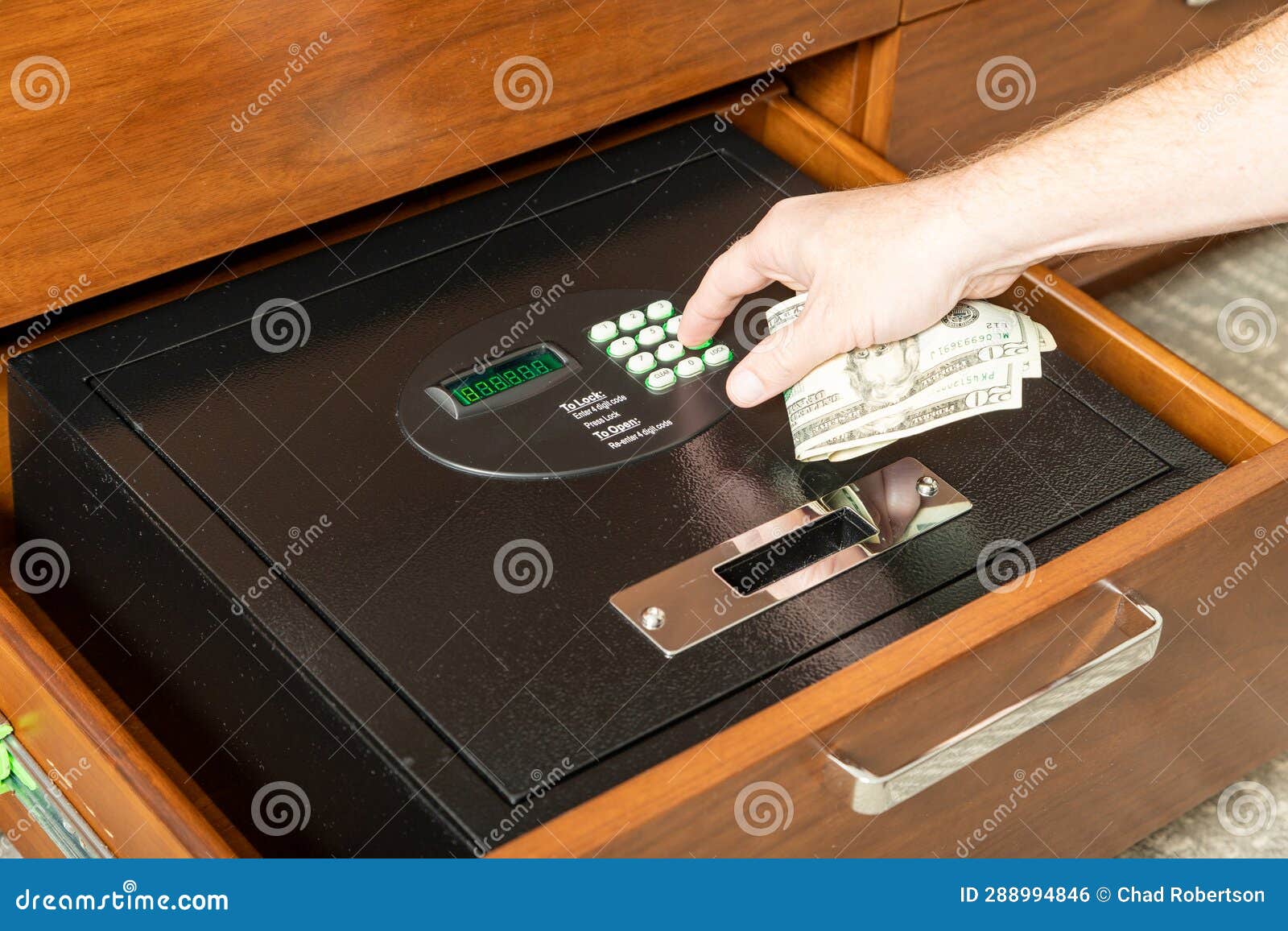 Hand Opening Safe in Hotel Room To Store Valuables Stock Photo - Image ...