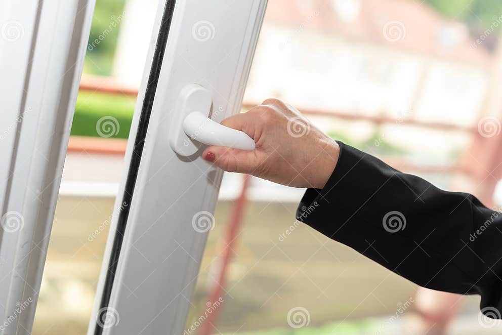 Hand opening a window stock image. Image of opening - 265333423