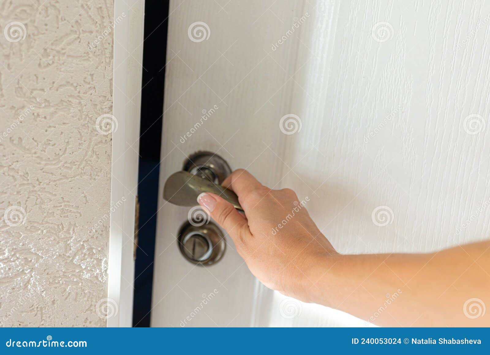 Hand Opens a Door with a Metal Handle To Another Room Stock Photo ...