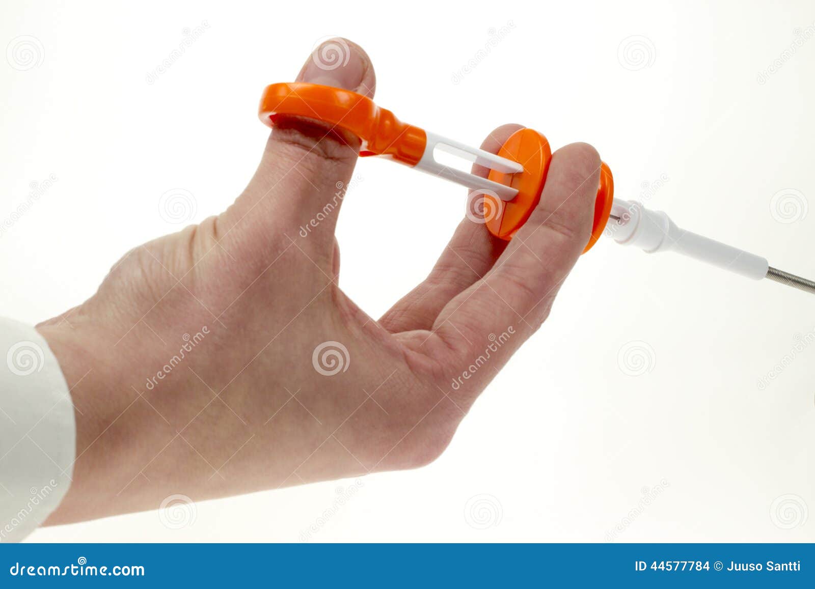 A Hand Operating a Medical Device Syringe Stock Photo - Image of ...