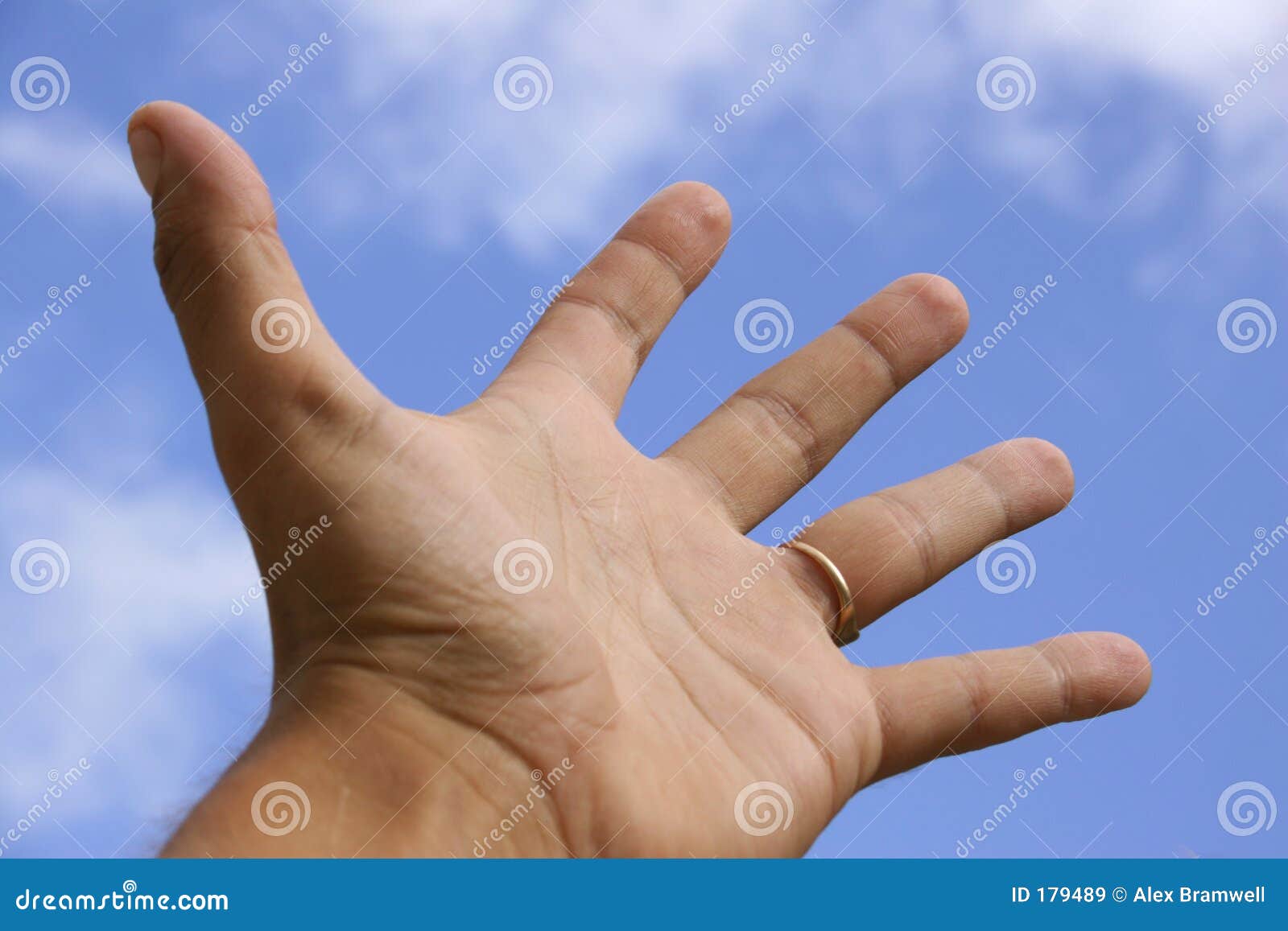 Hand Outstretched and Sky stock image. Image of success - 179489
