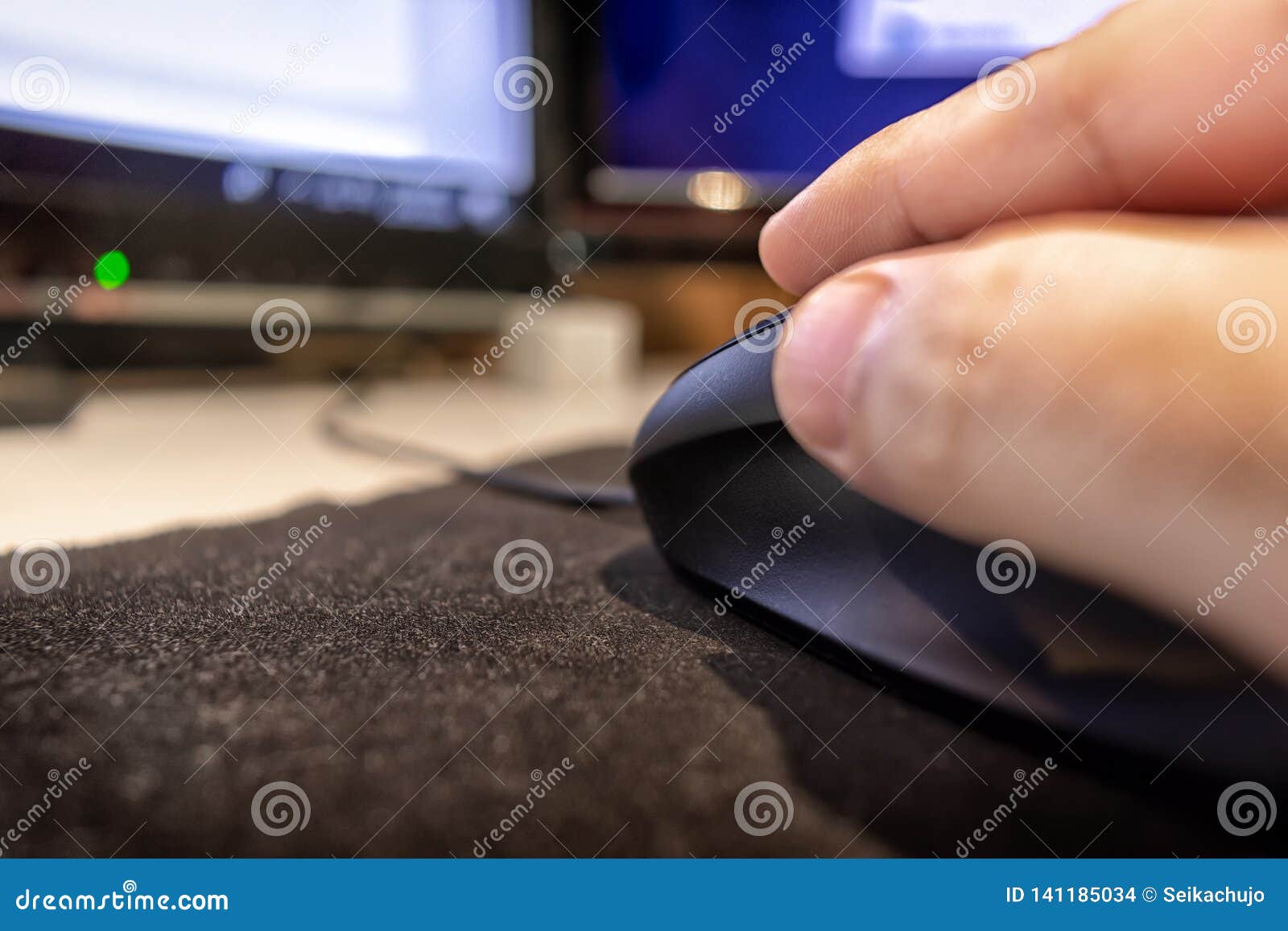 Hand Over Computer Mouse on a Mouse Pad Stock Photo - Image of scroll ...