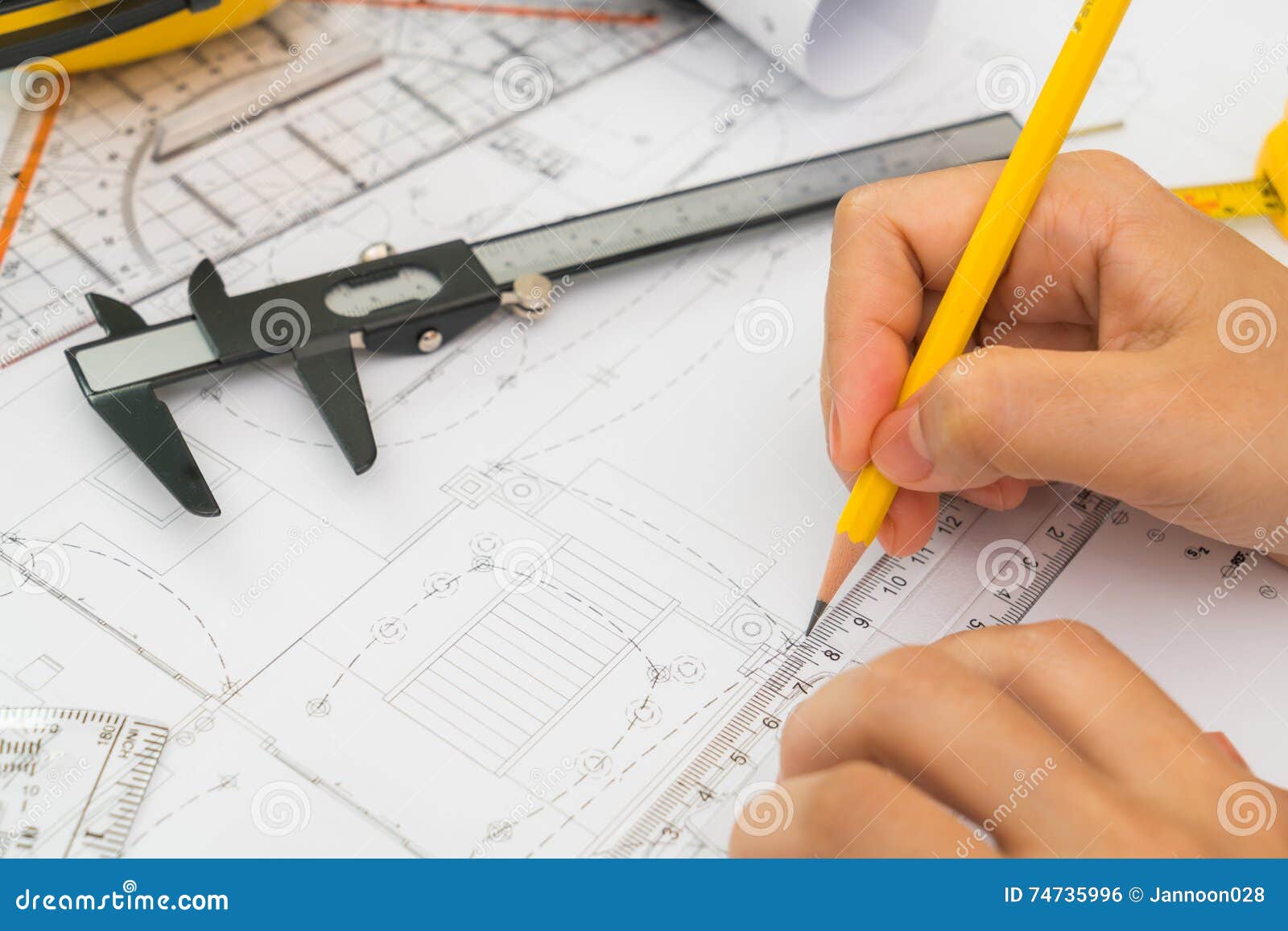 Hand Over Construction Plans with Yellow Helmet and Drawing Tool Stock ...